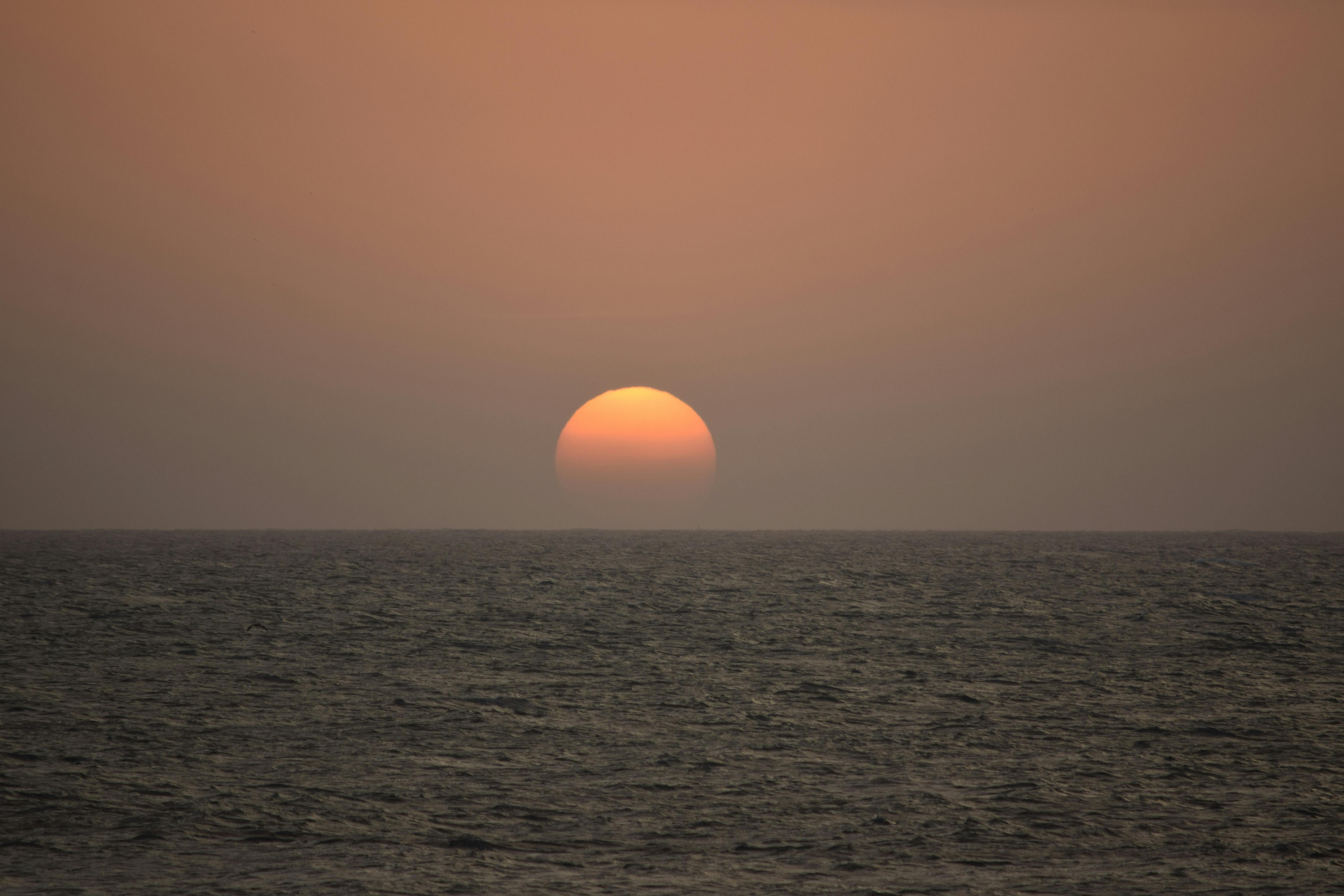 A View of the Sea During Sunset · Free Stock Photo