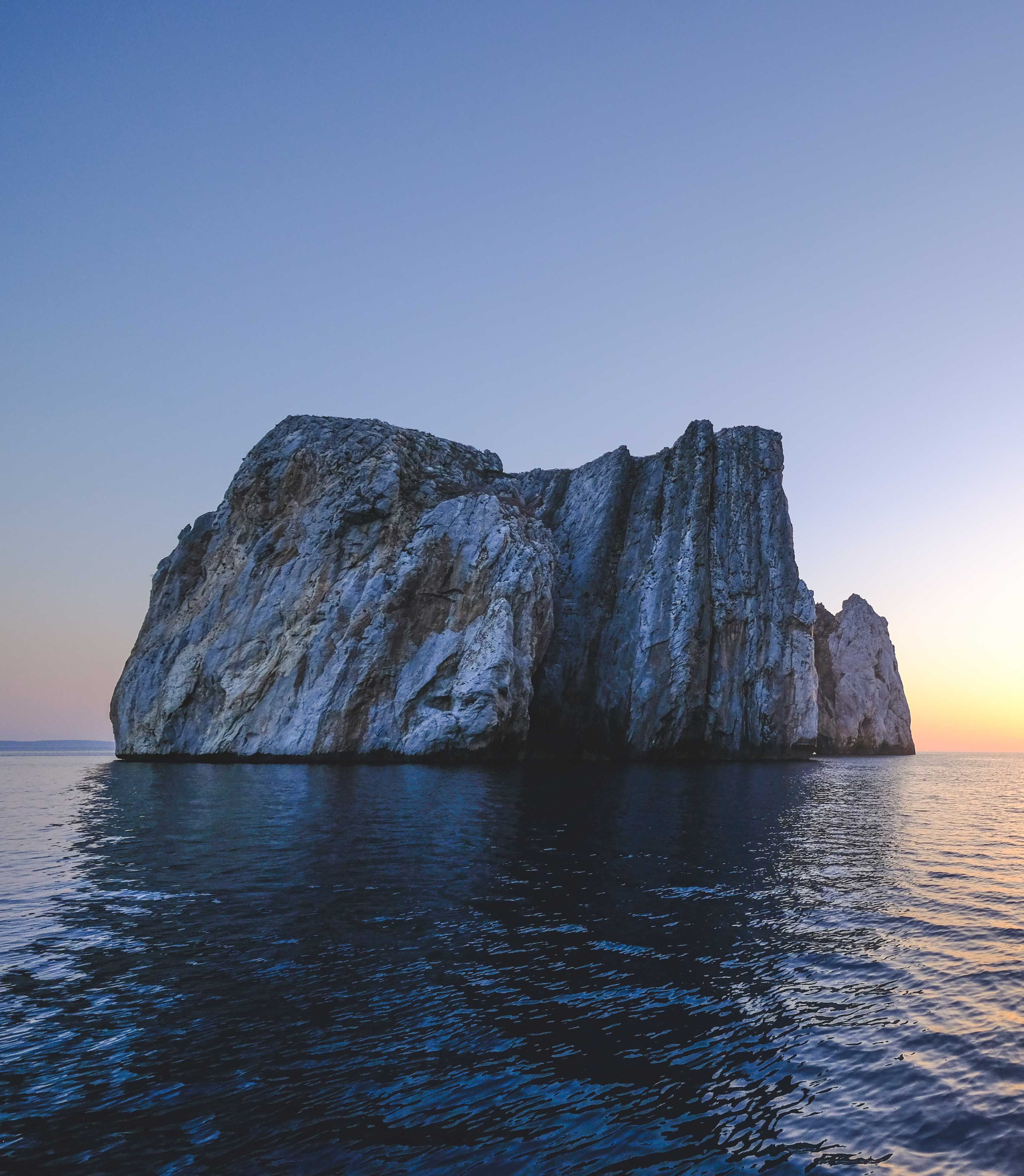 Clear Sky over Rock Formation · Free Stock Photo
