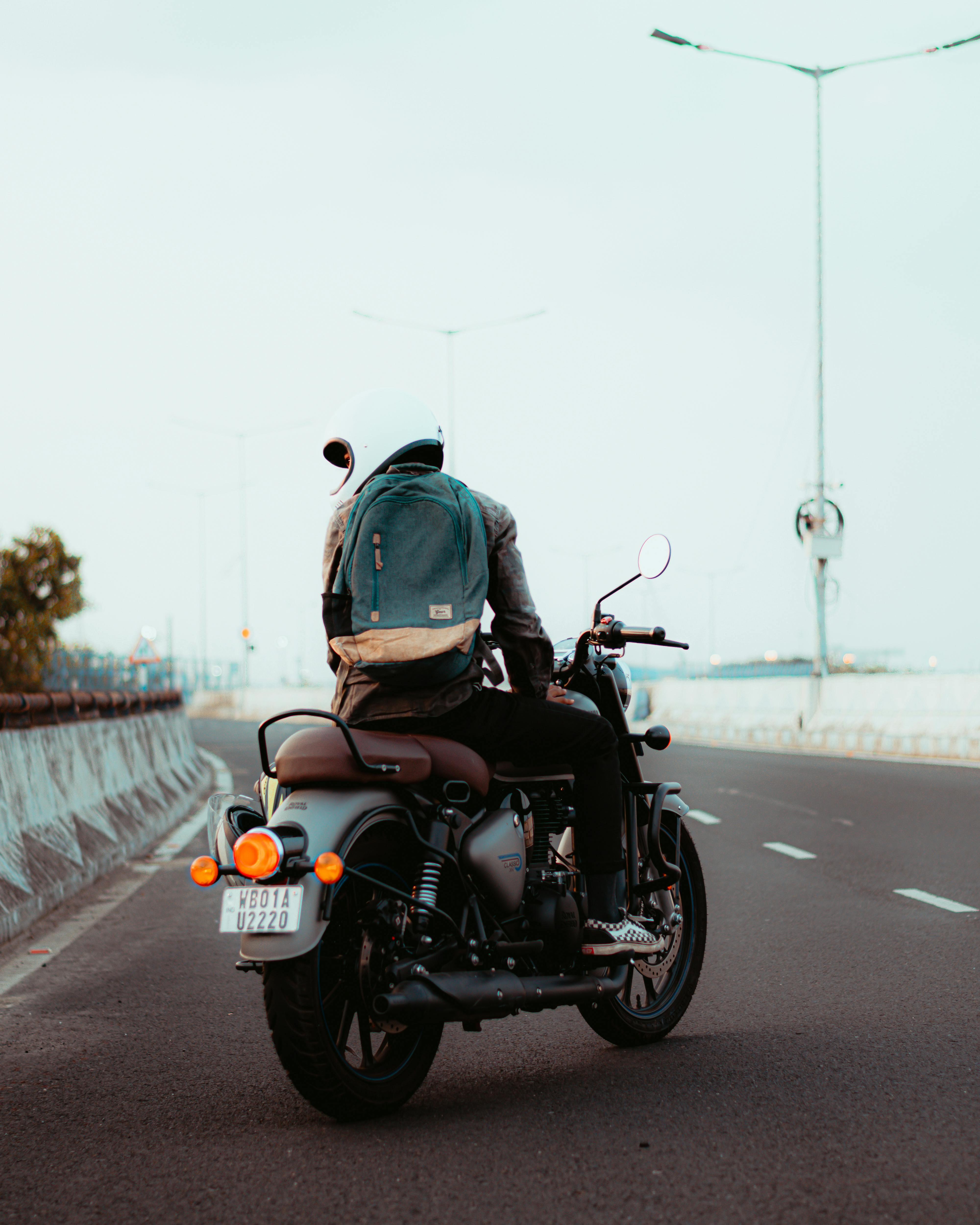 Person Riding Motorcycle during Golden Hour · Free Stock Photo