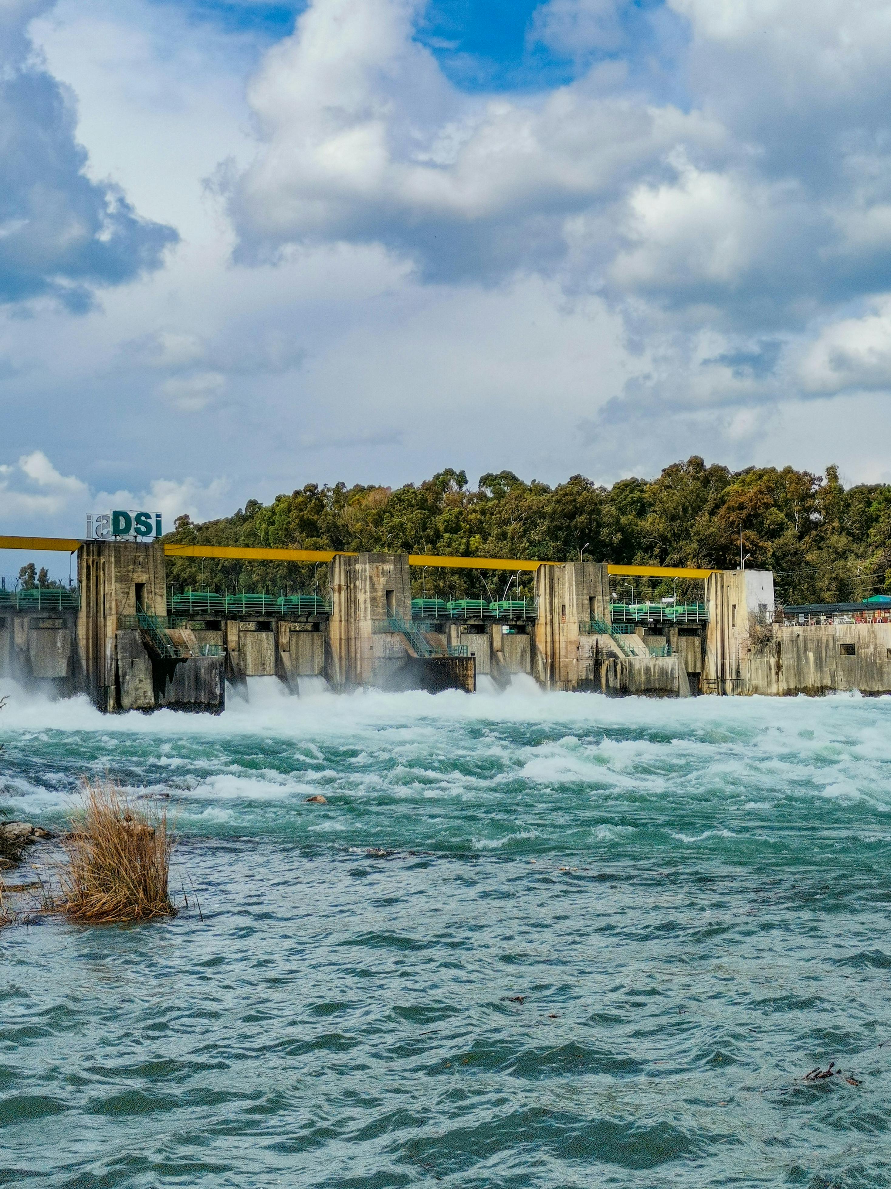 Massive Water Flow on a Dam · Free Stock Photo