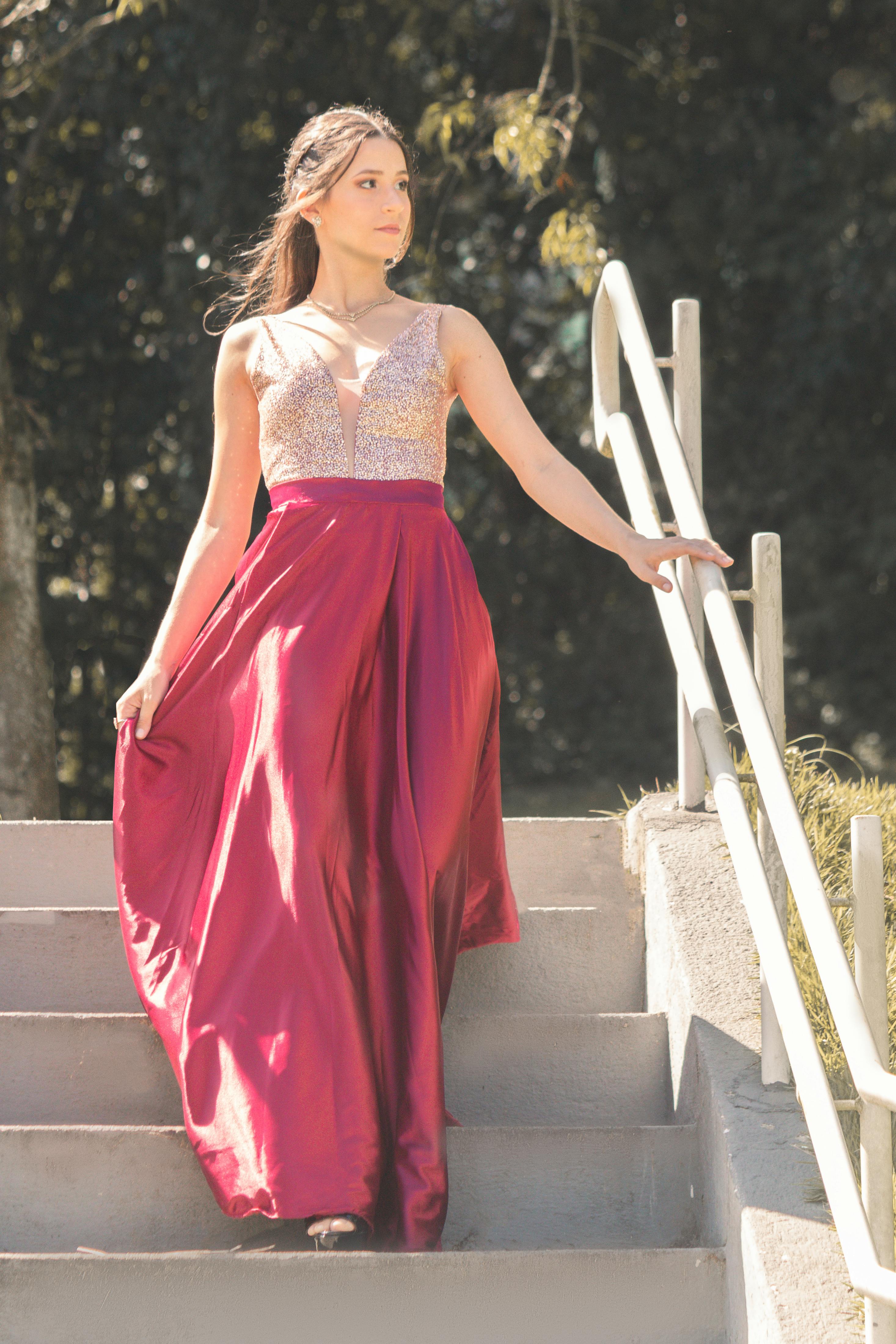 Woman Wearing a Dress Walking Down the Stairs · Free Stock Photo
