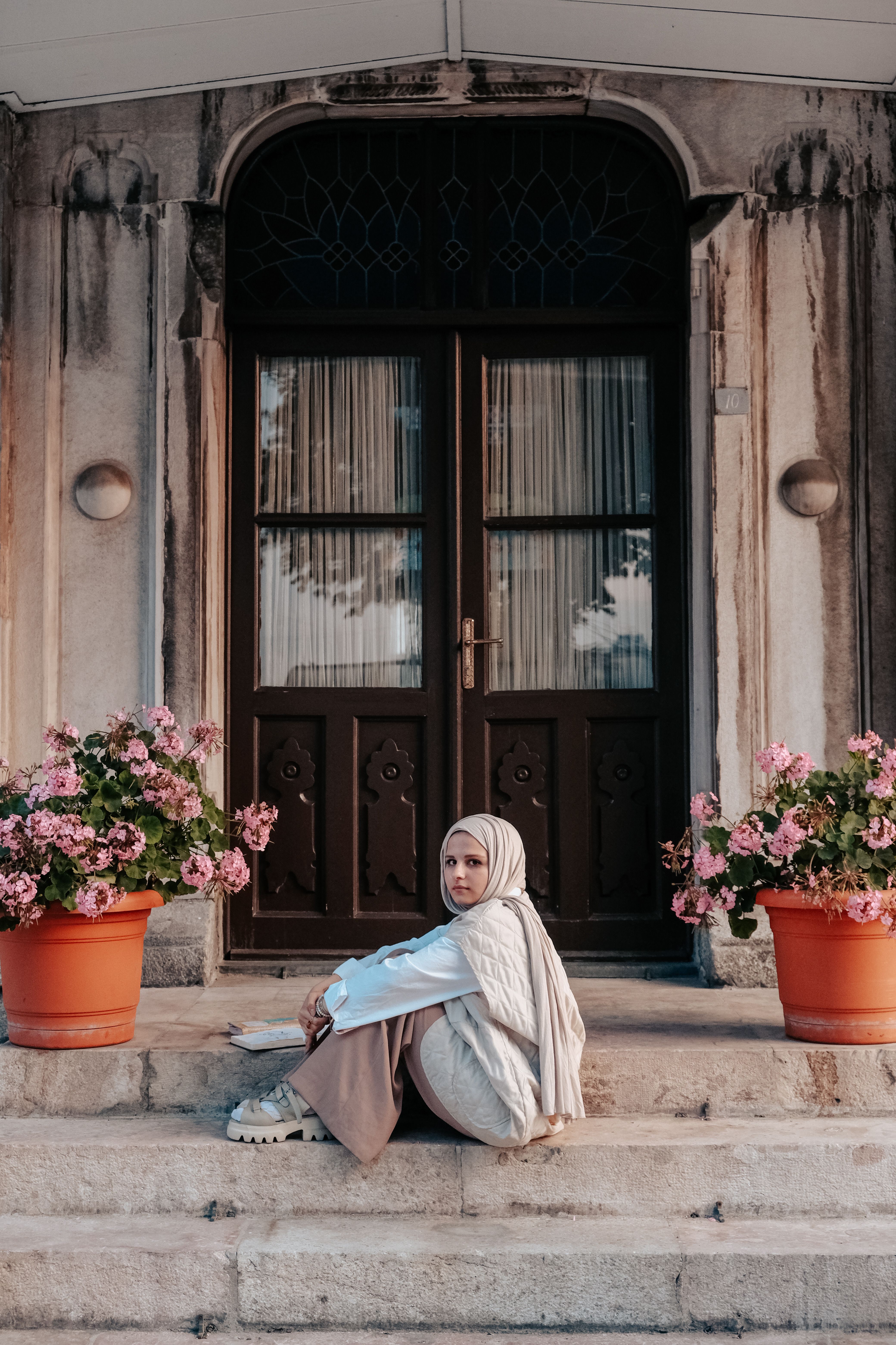 Woman Sitting on the Steps · Free Stock Photo