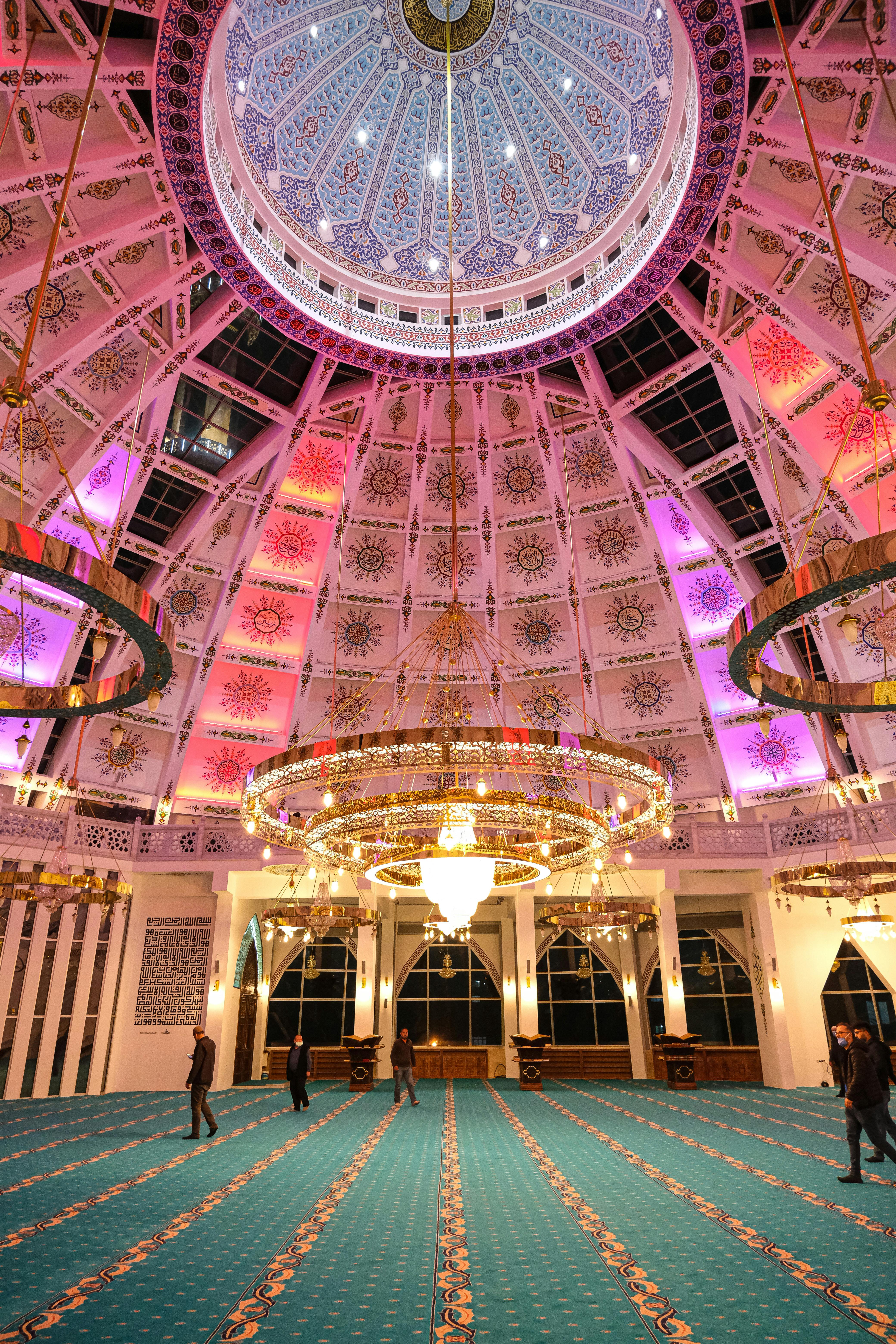 People Praying Inside Mosque with Pillars · Free Stock Photo