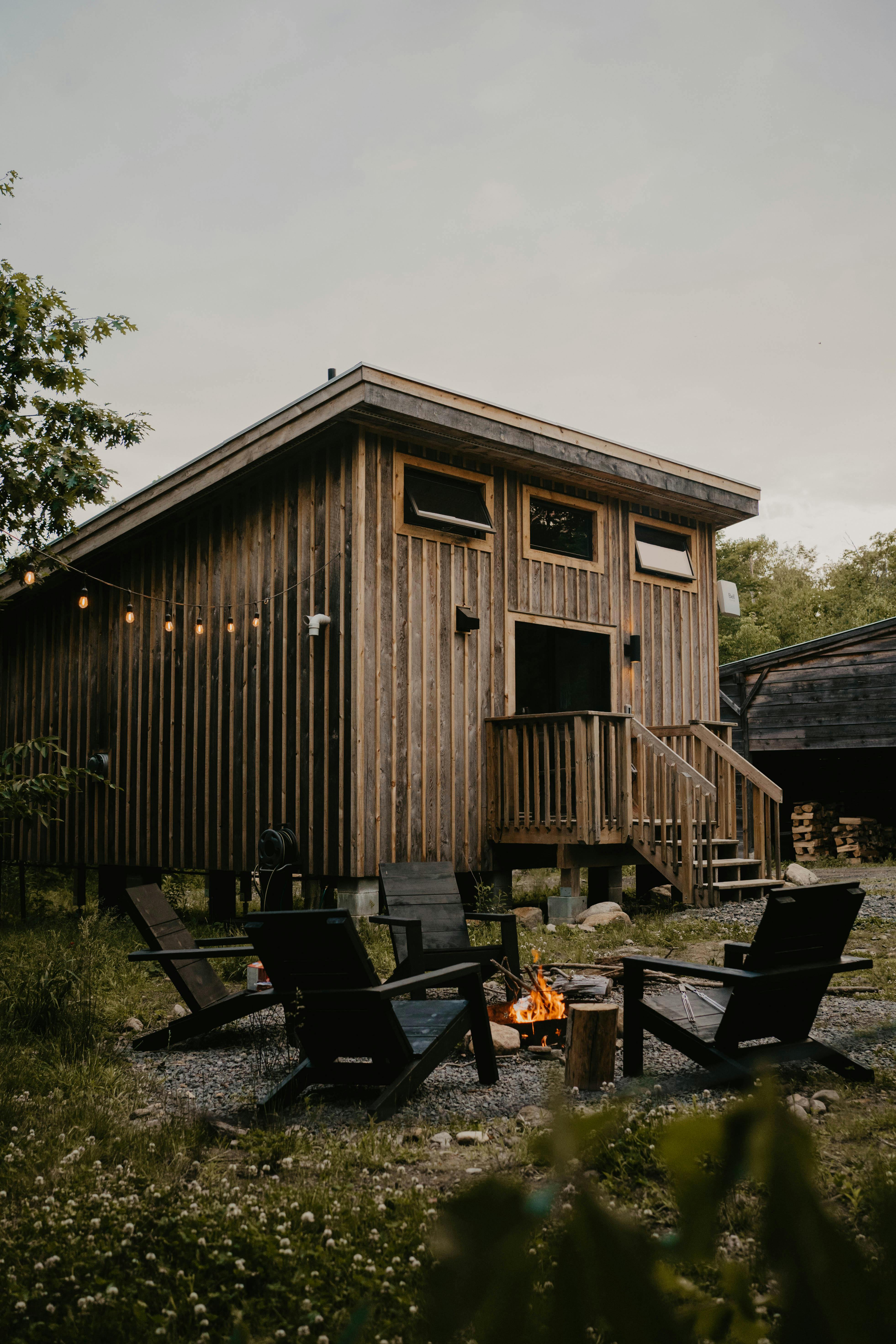 Campfire Place near Wooden Building · Free Stock Photo