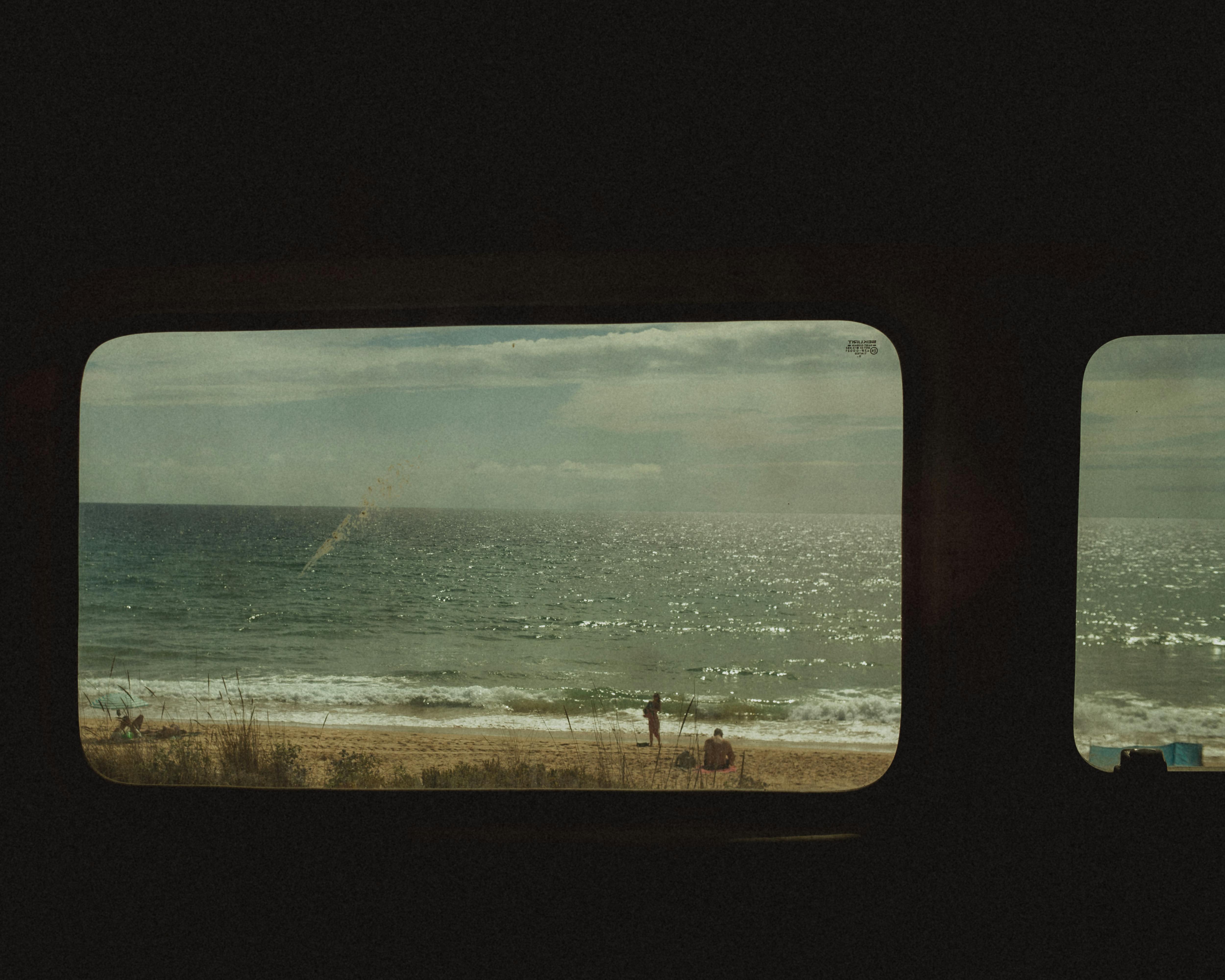 Ocean View Through Glass Window · Free Stock Photo