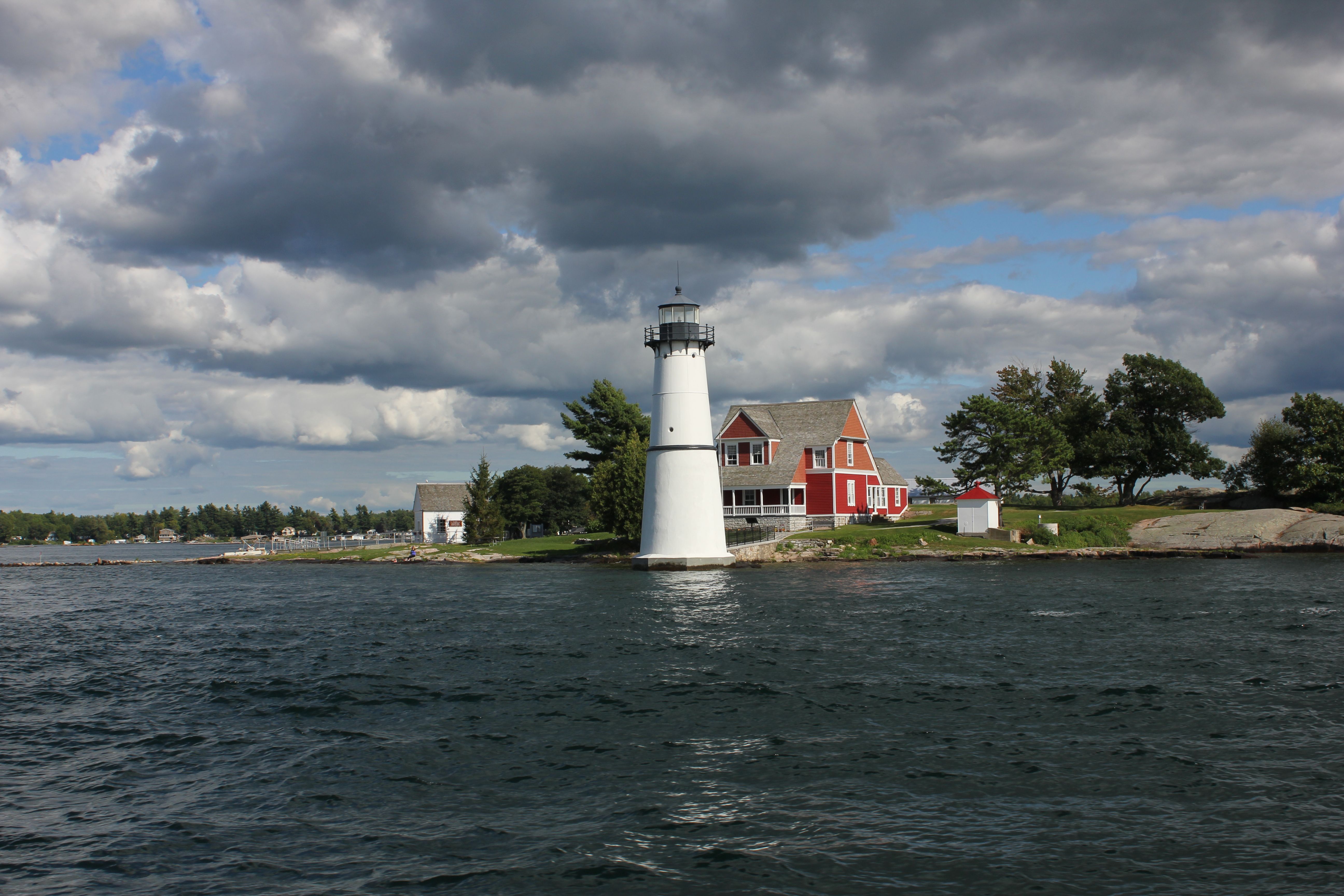 Lighthouse on Top of a Cliff · Free Stock Photo