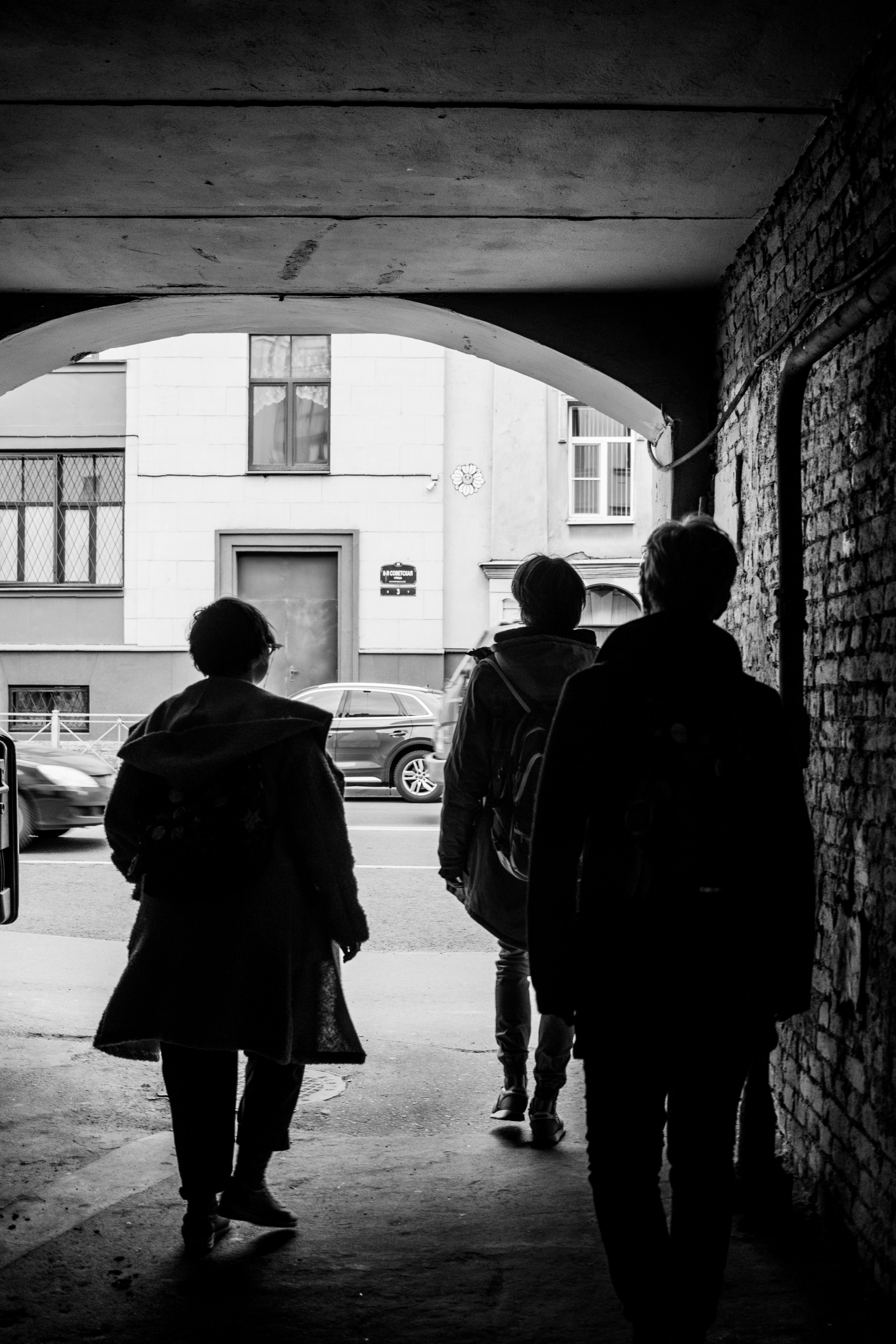 People Walking Under the Bridge · Free Stock Photo