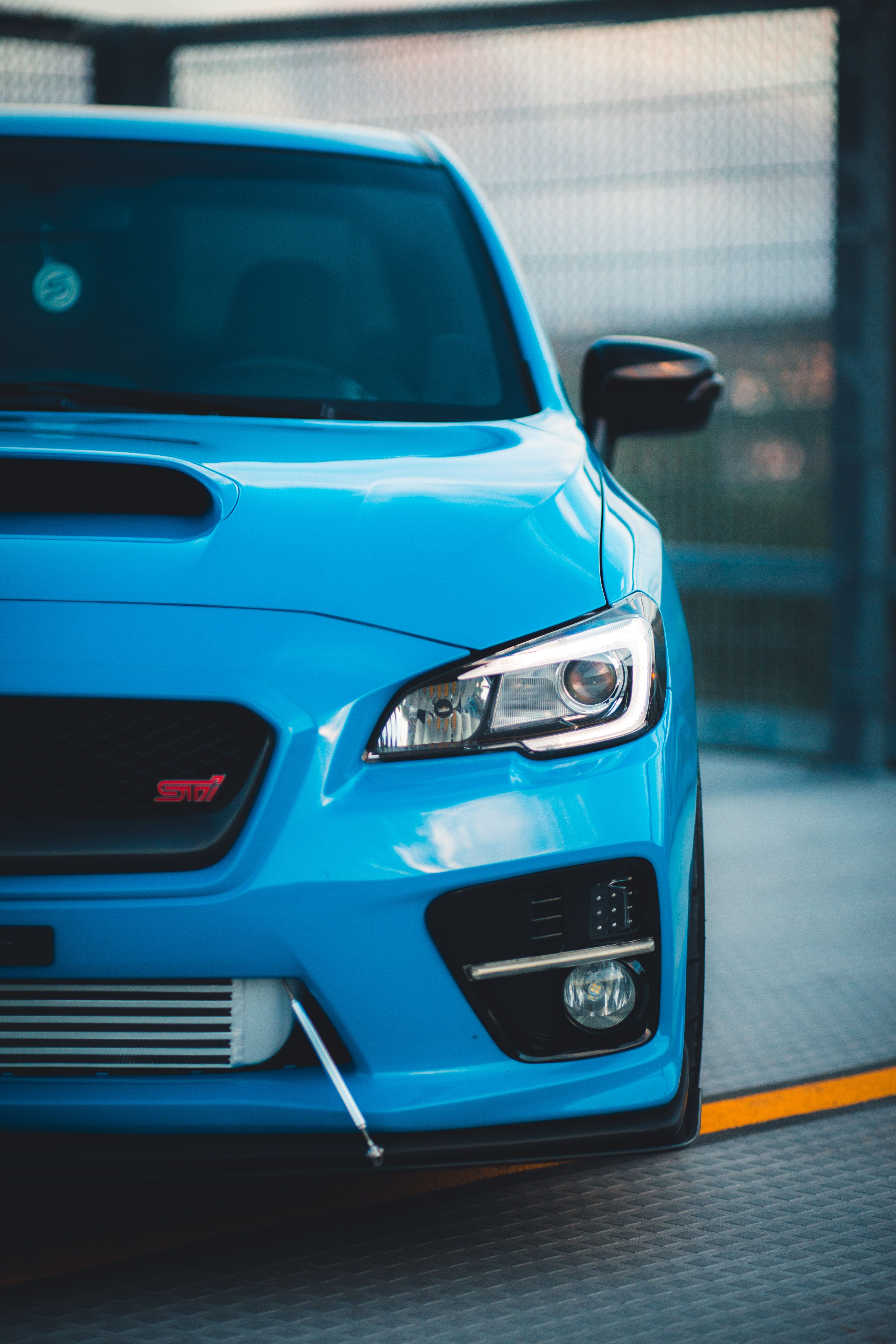 Blue Car at the Parking Lot · Free Stock Photo