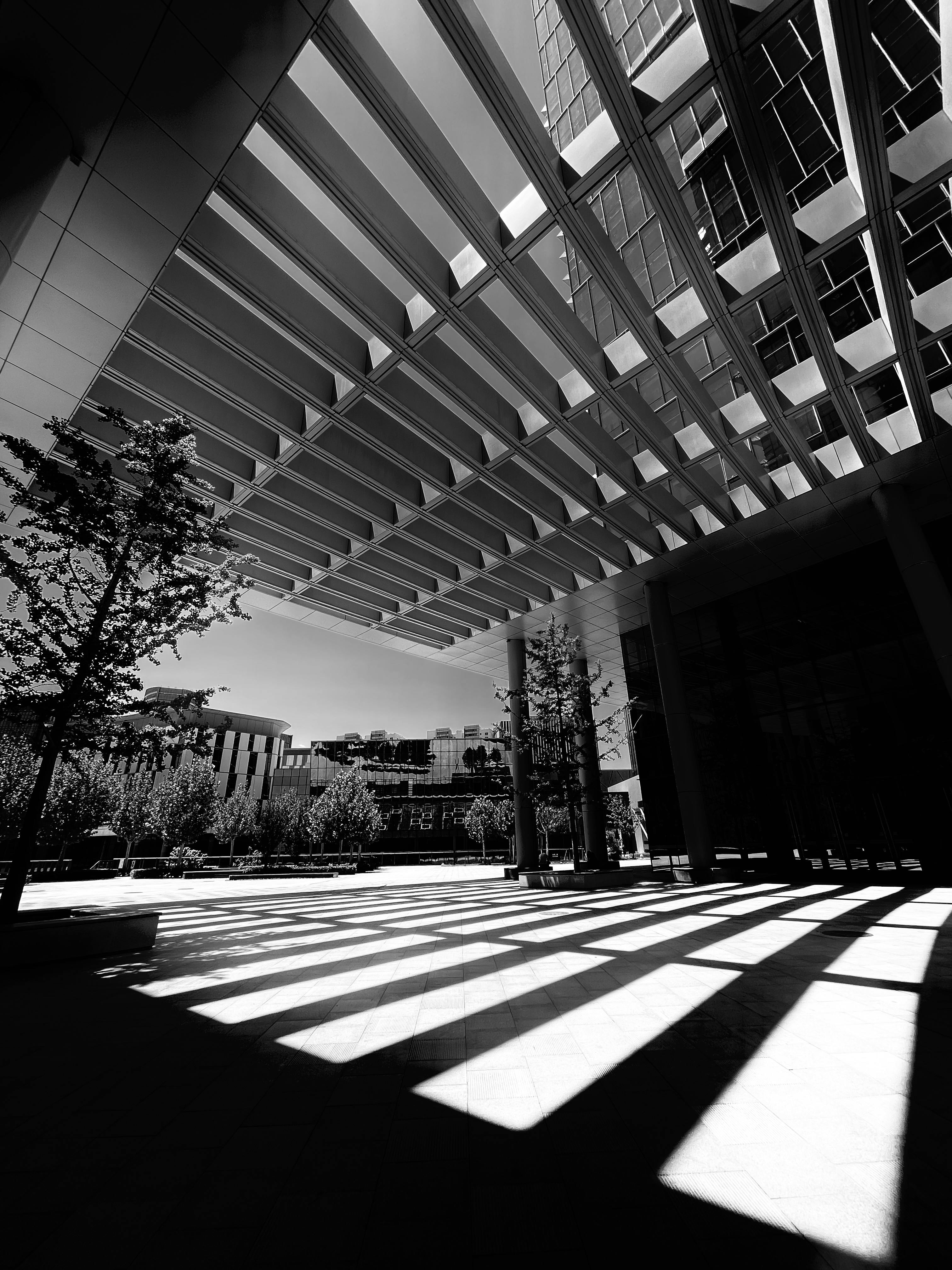 Sunlight and Shadows near Building · Free Stock Photo