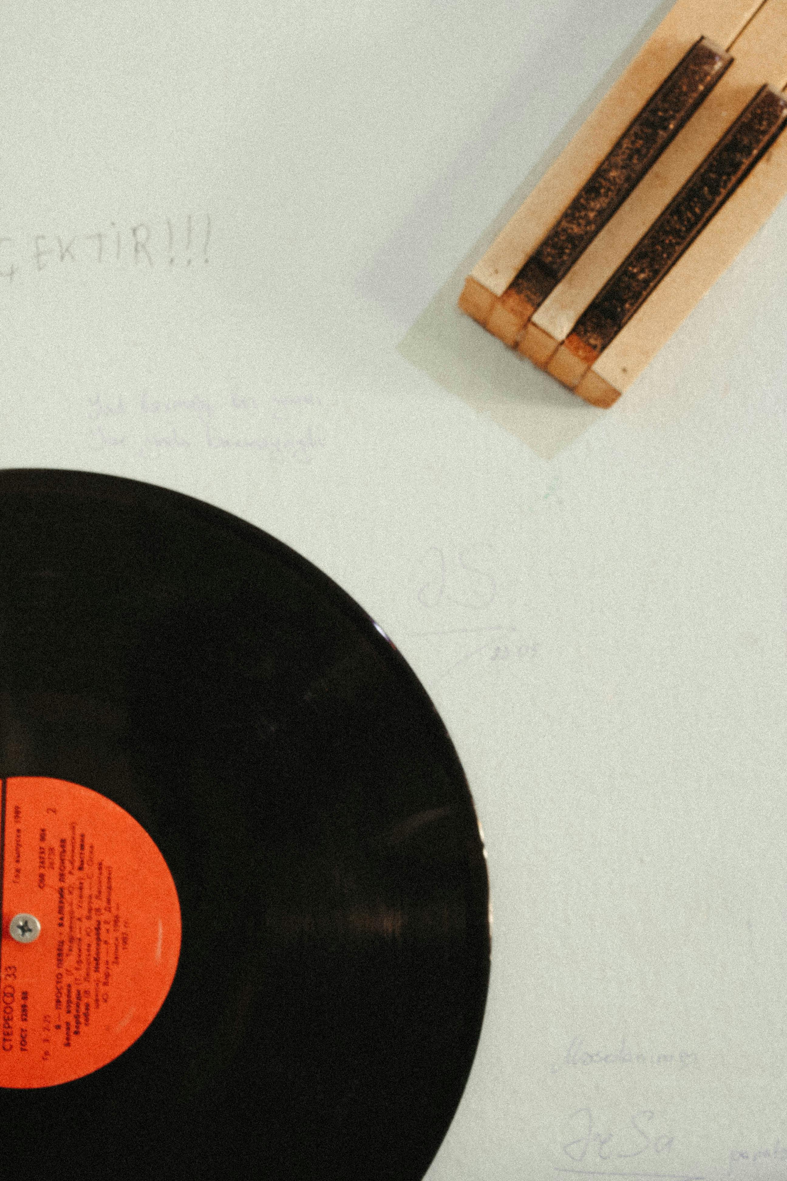 Overhead Shot of a Vinyl Record Near Piano Keys · Free Stock Photo