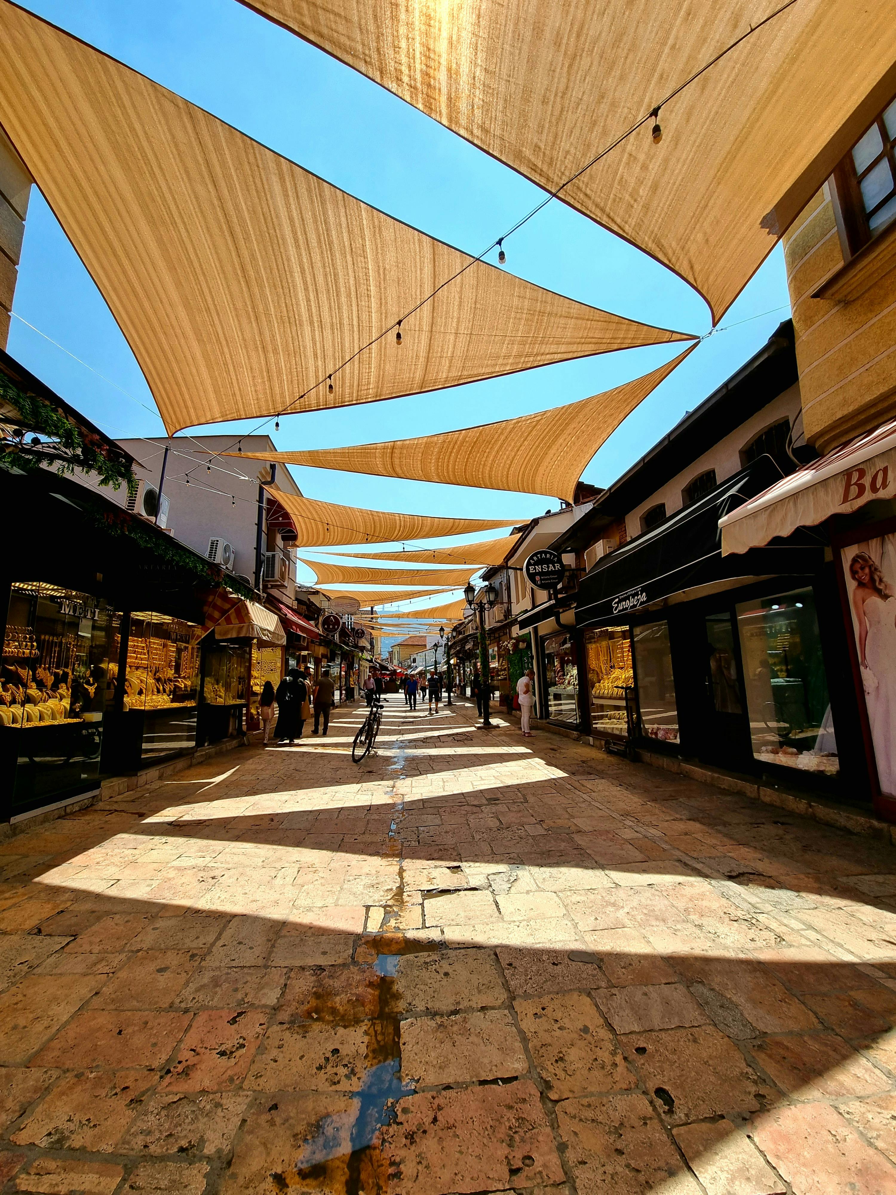 Alley with Stores and Shops · Free Stock Photo