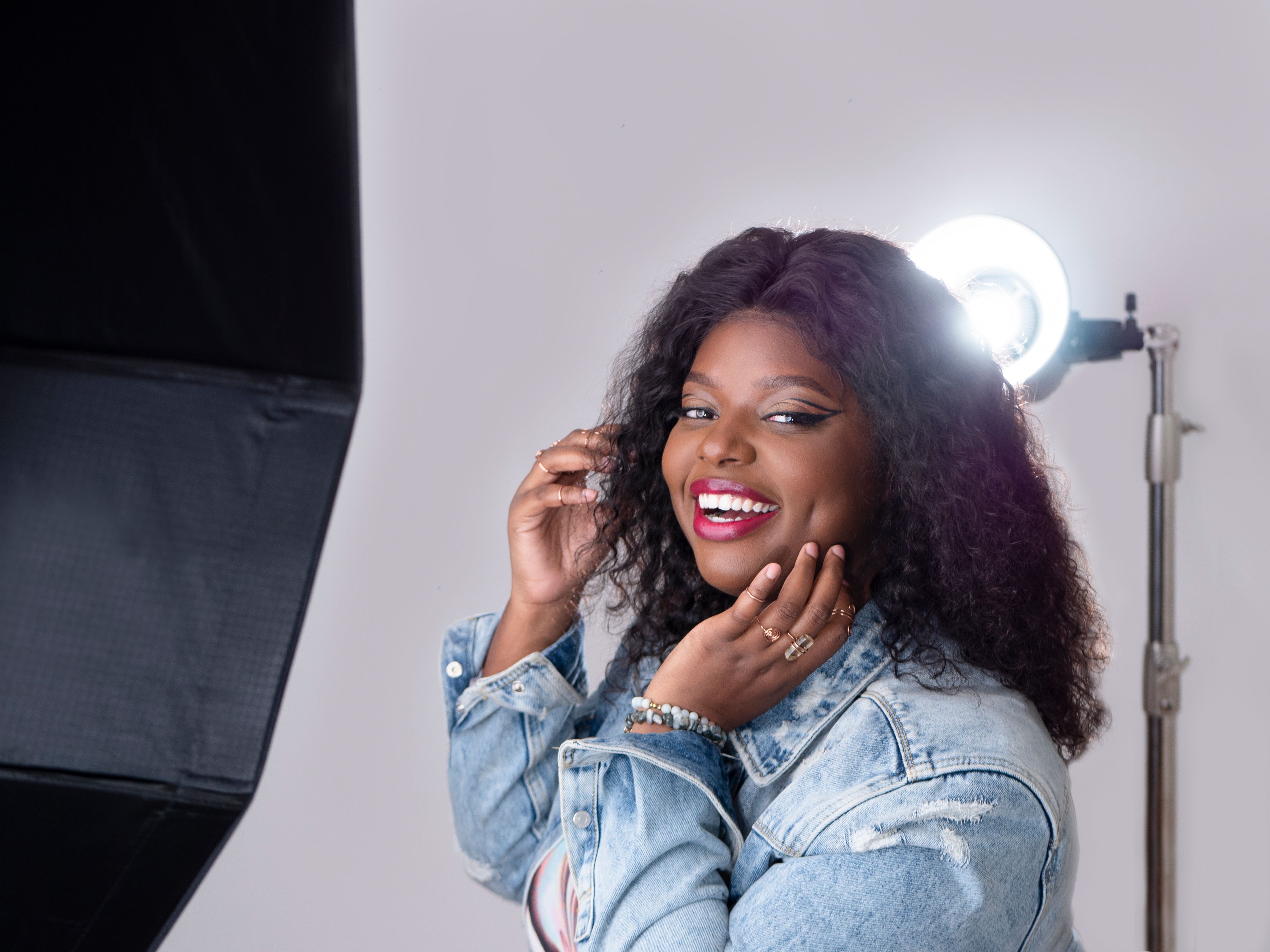 Woman with Curly Hair Smoking · Free Stock Photo