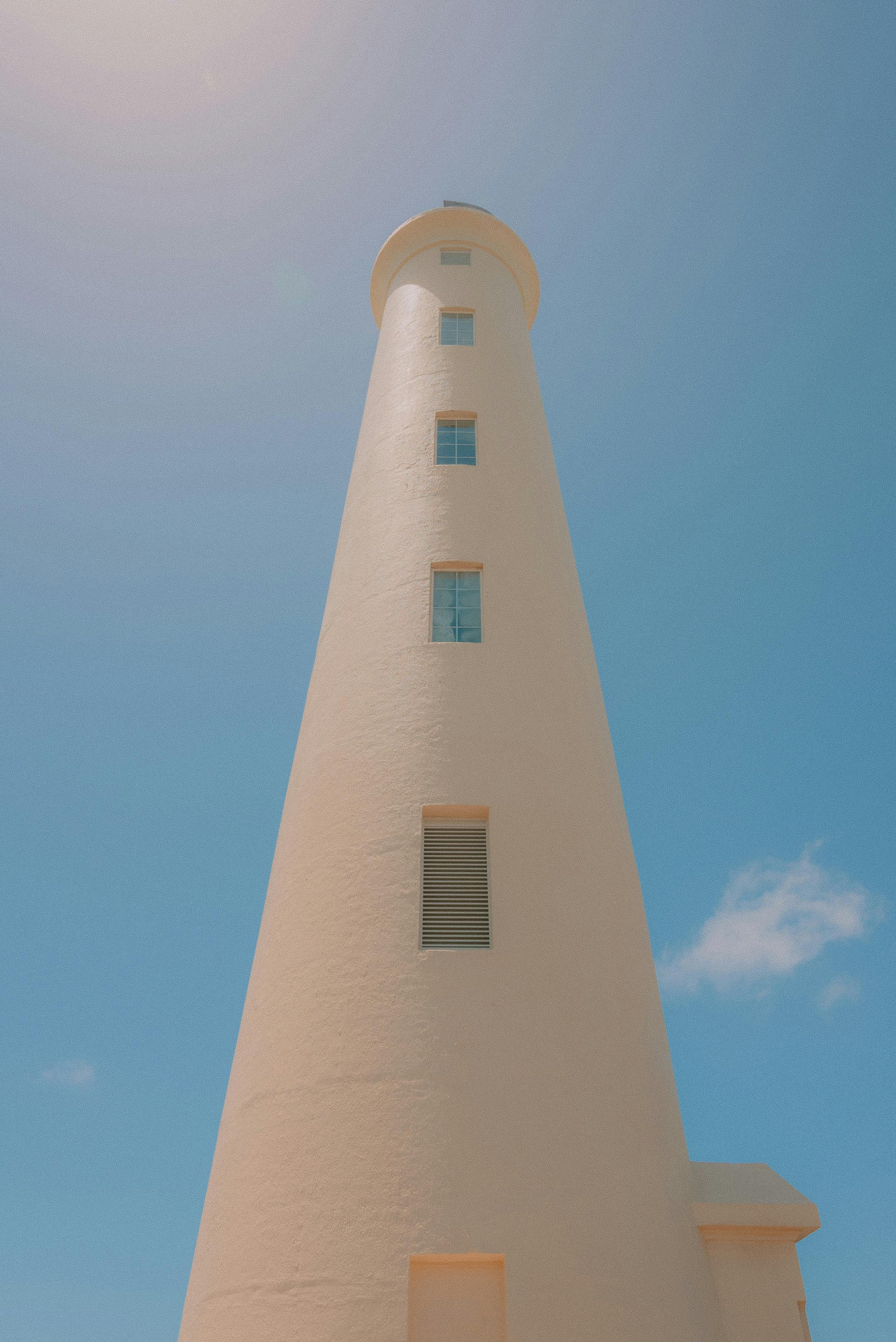 Gray Scale Photography of Lighthouse · Free Stock Photo