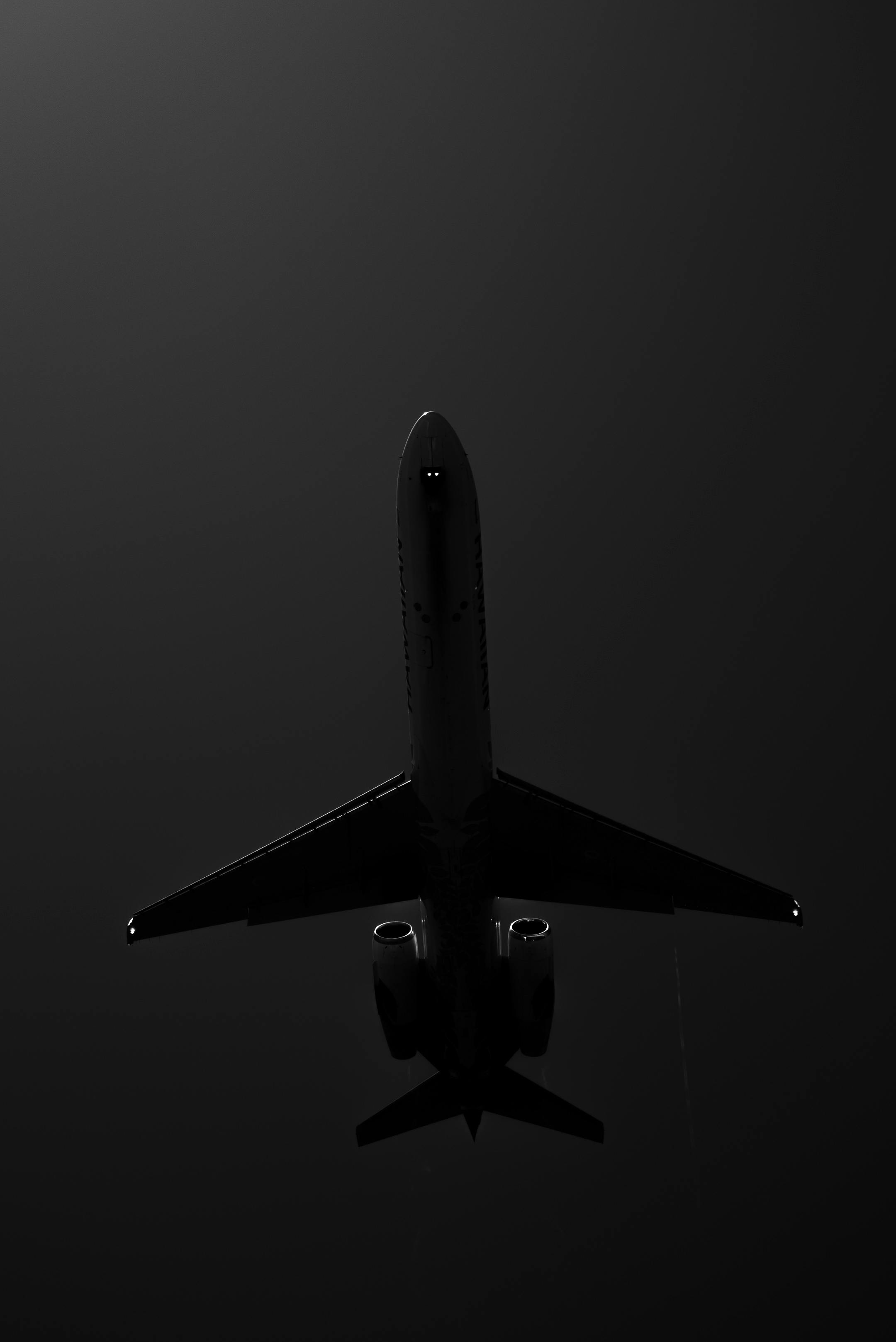 Grayscale Photo of an Airplane · Free Stock Photo