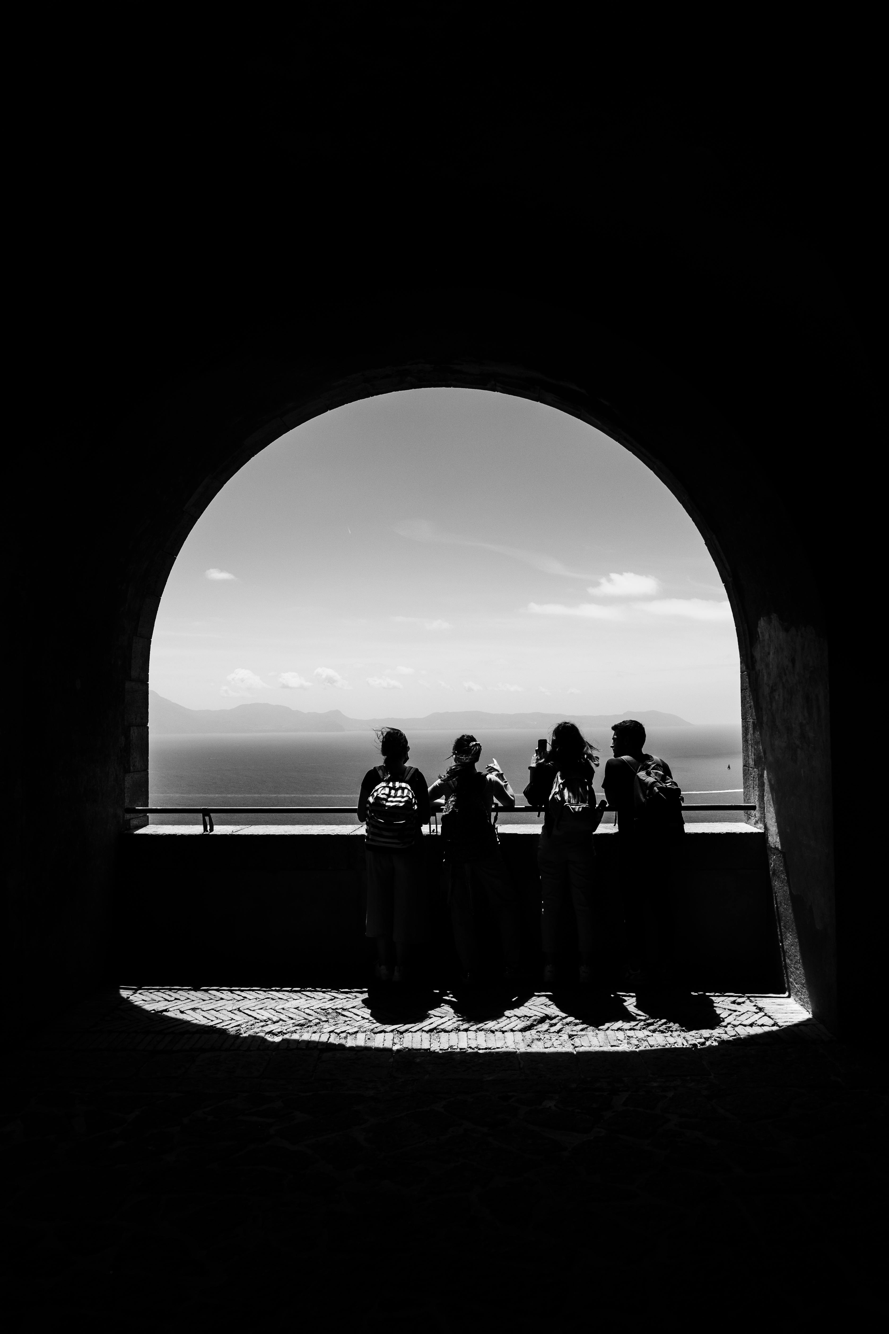 Woman Standing Beside Window · Free Stock Photo