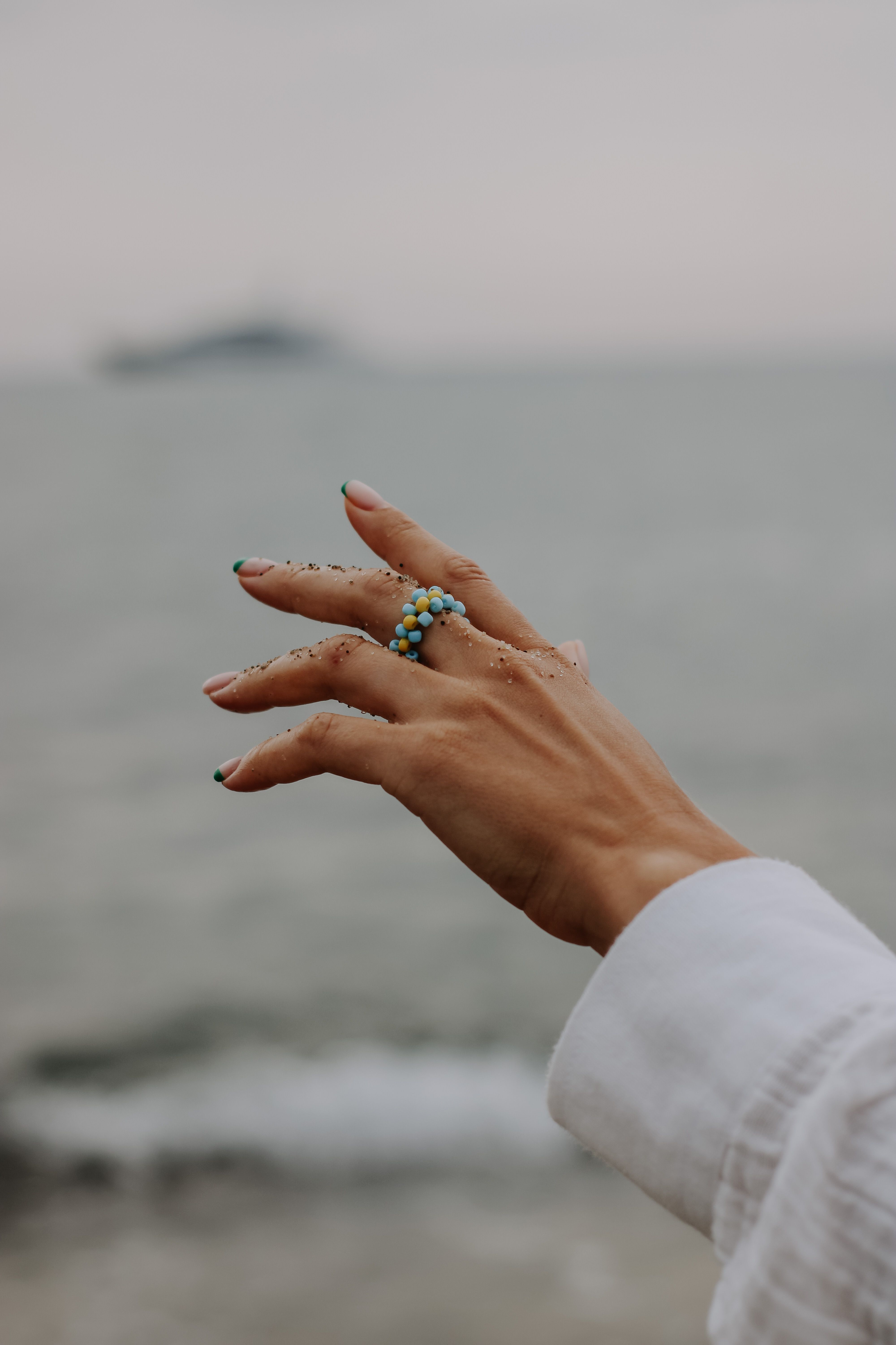 Photo of a Person's Hand Reaching · Free Stock Photo