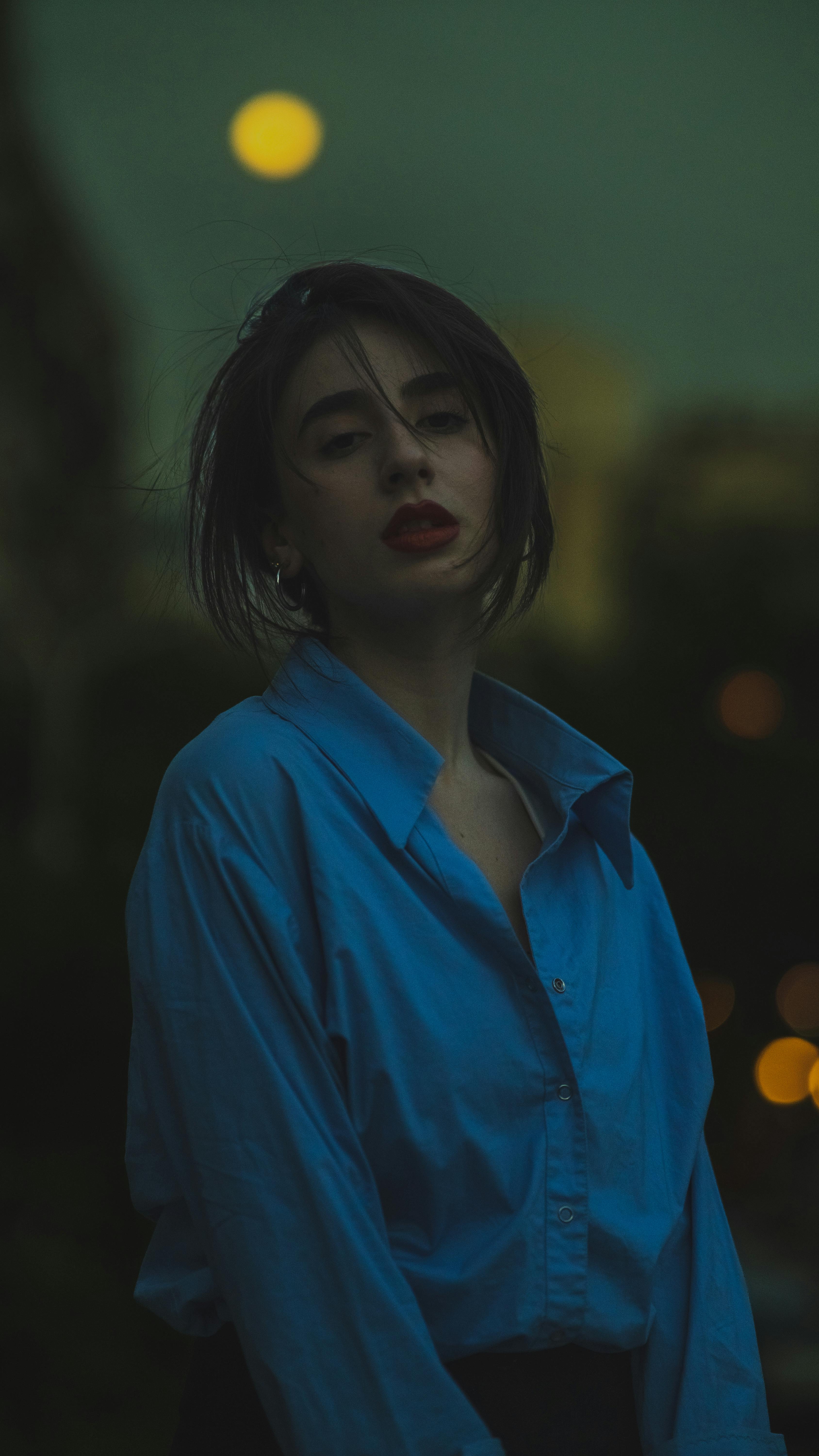 Beautiful Woman in Blue Button Up Shirt · Free Stock Photo