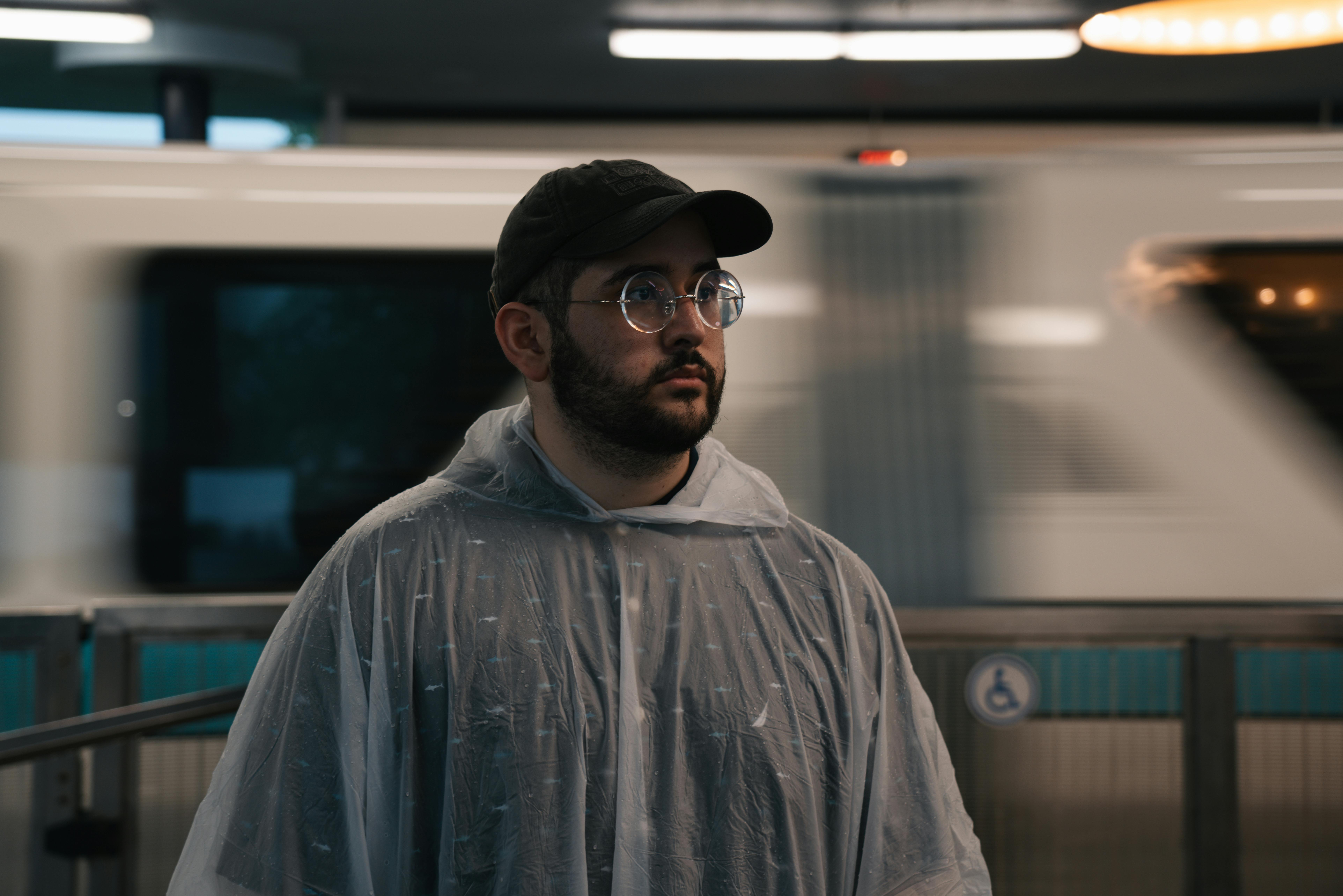 Bearded Man Wearing Raincoat · Free Stock Photo