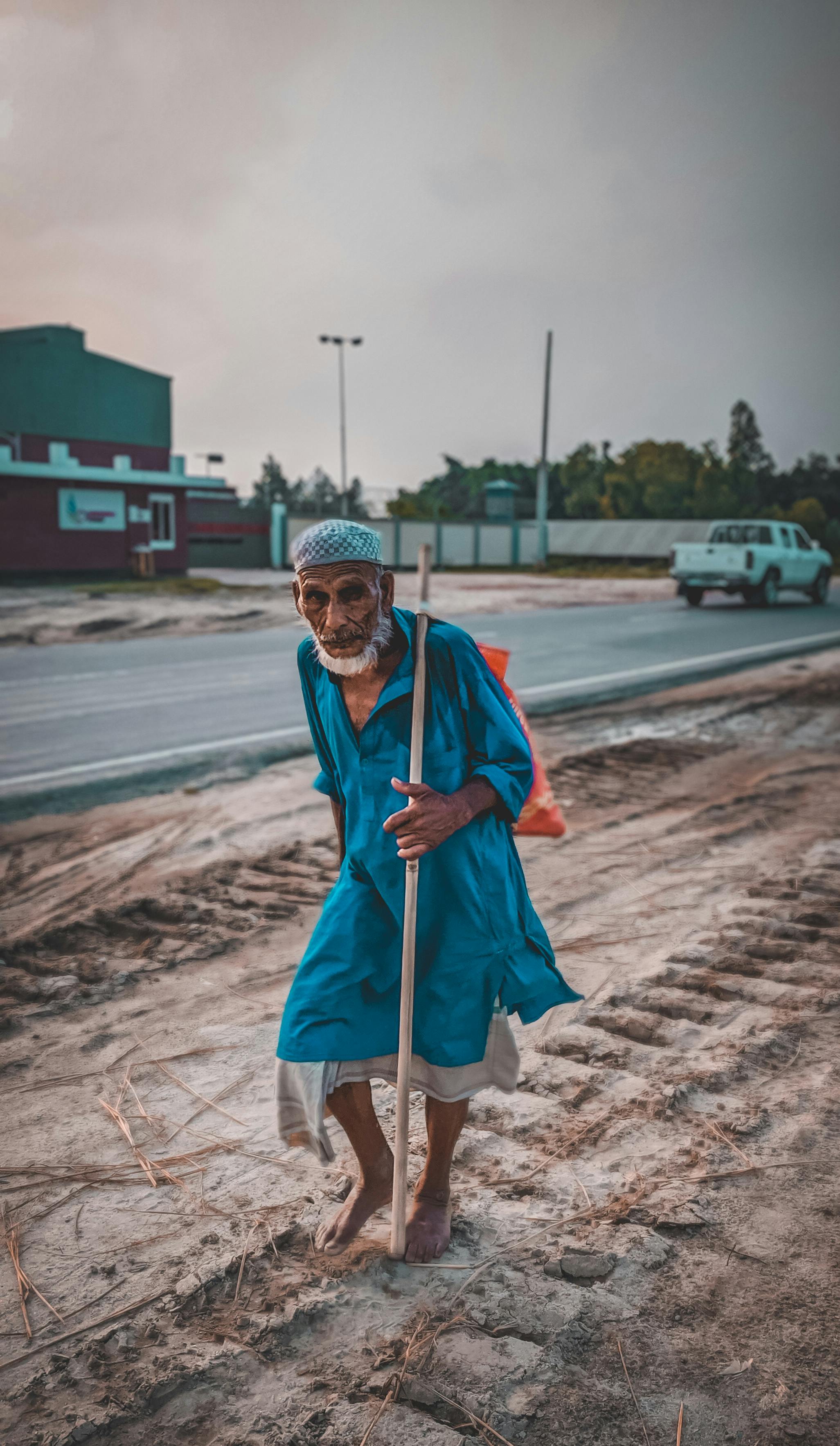 Photograph of an Elderly Man Walking · Free Stock Photo