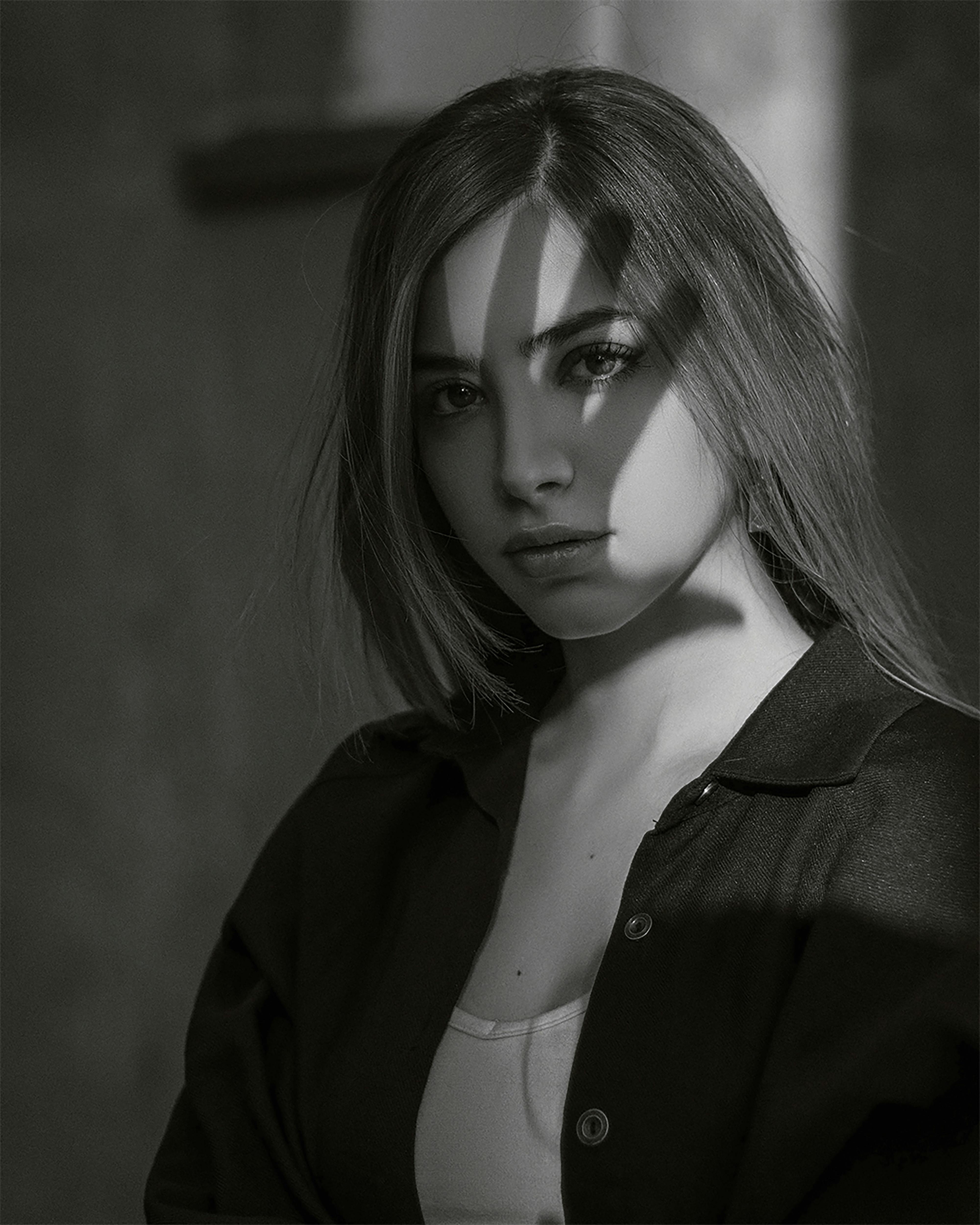 A Hand Shadow on a Woman's Face · Free Stock Photo