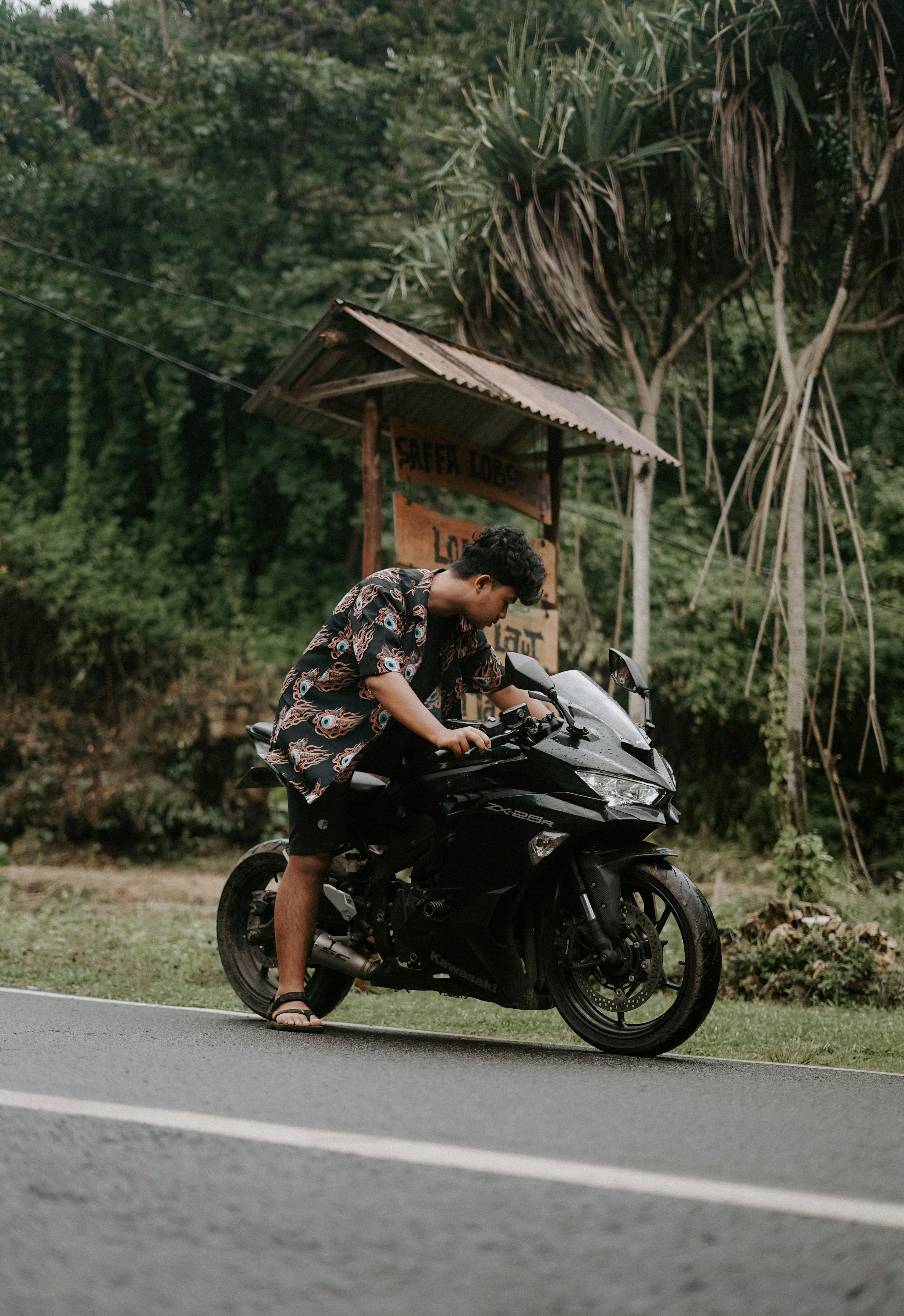 Man Sitting on Motorcycle · Free Stock Photo