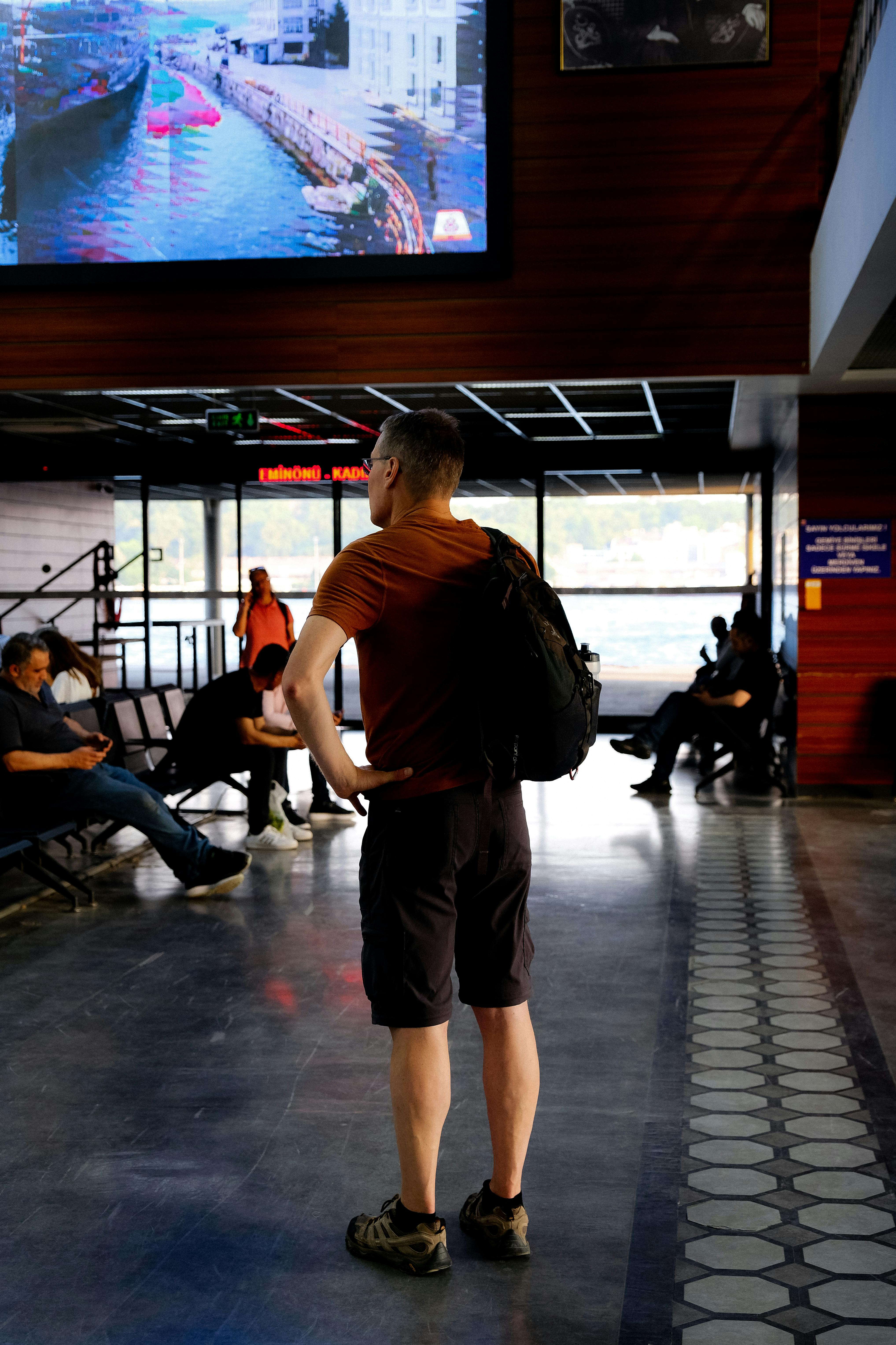 Photo of a Man Standing on a Station · Free Stock Photo