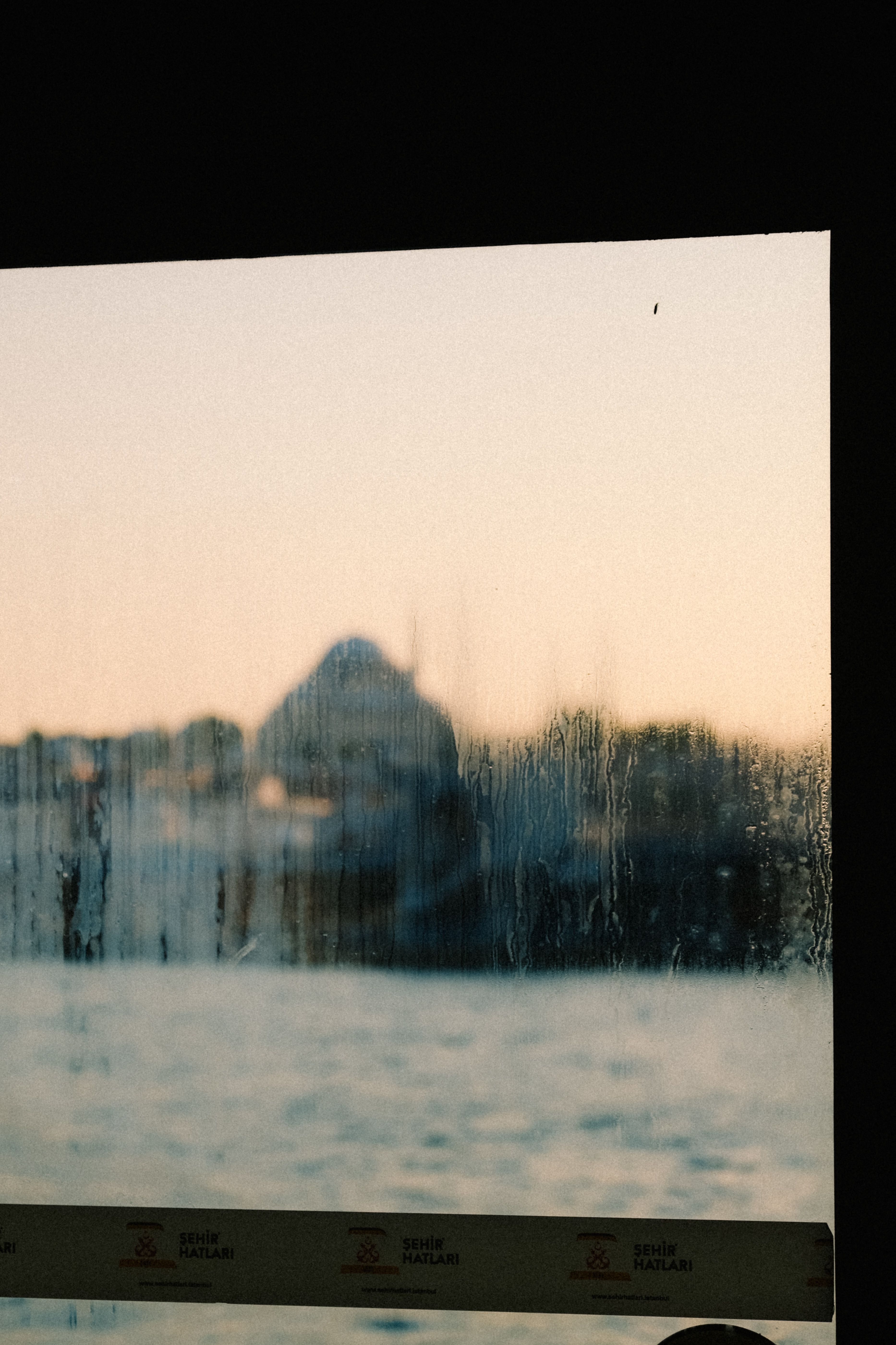 Landscape View through a Damp Window · Free Stock Photo