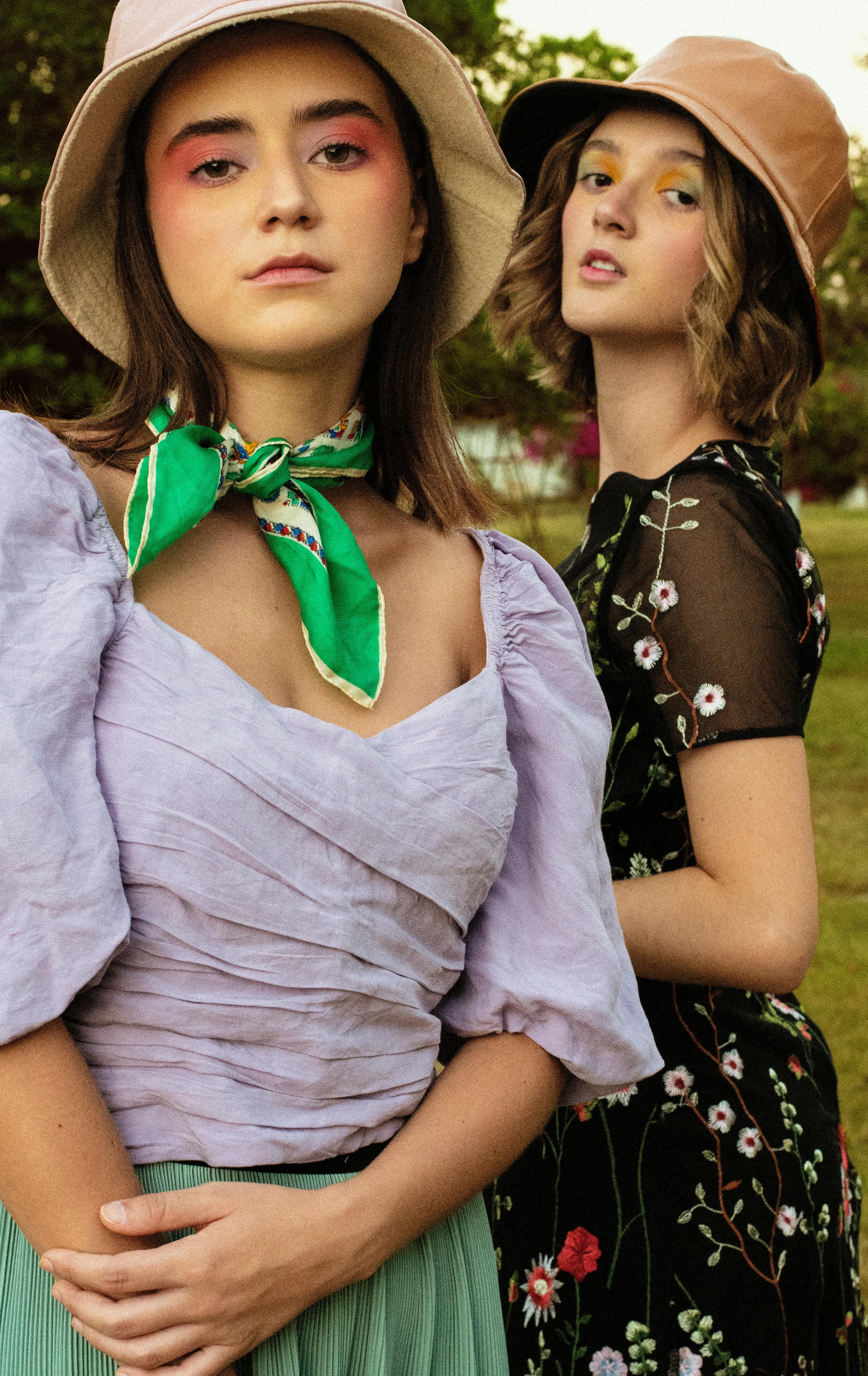 Photo of Girls with Hats Posing · Free Stock Photo