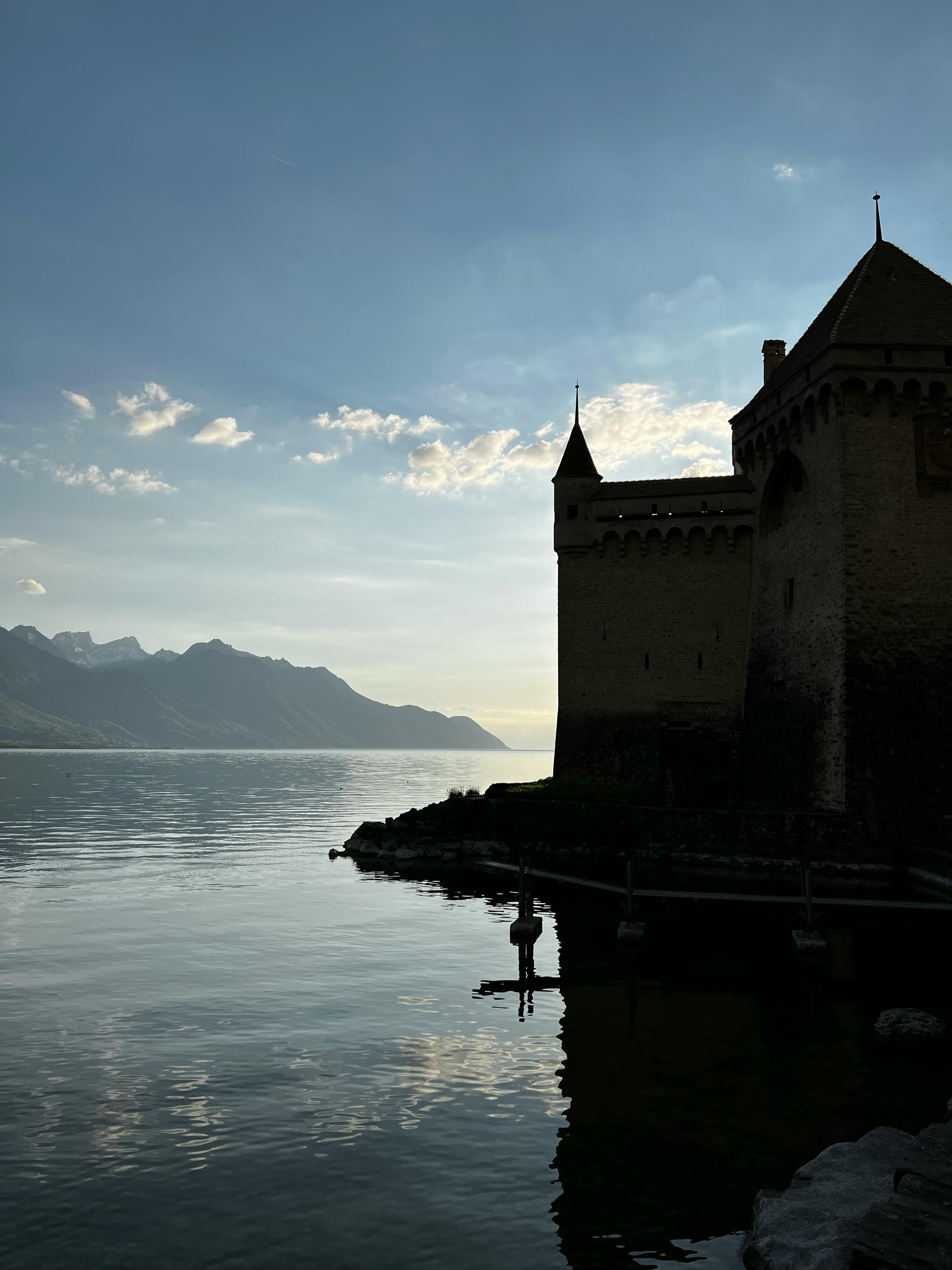 Silhouette of a Castle near a Lake · Free Stock Photo