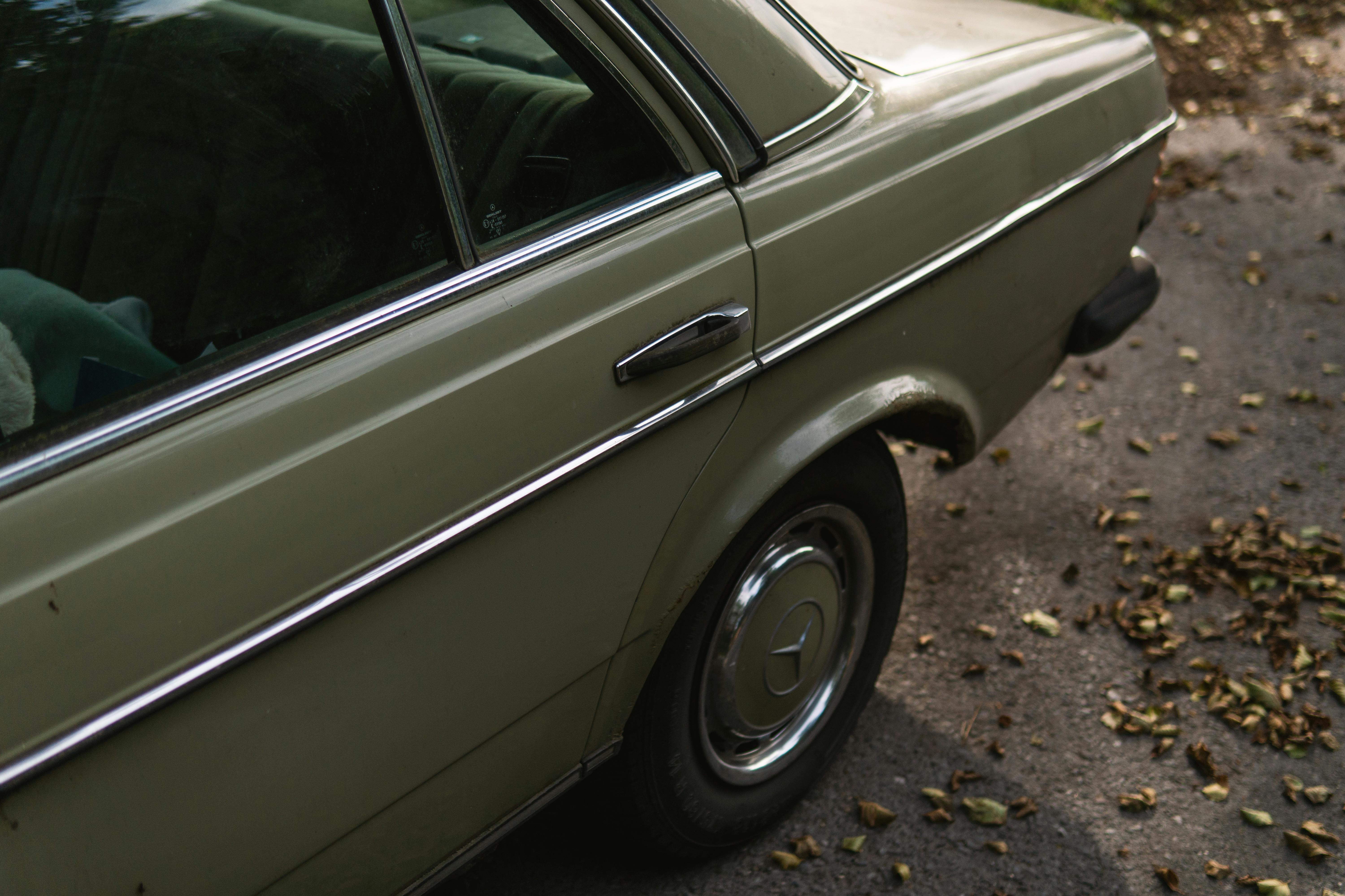 An Old Gray Car in Close-up Photography · Free Stock Photo