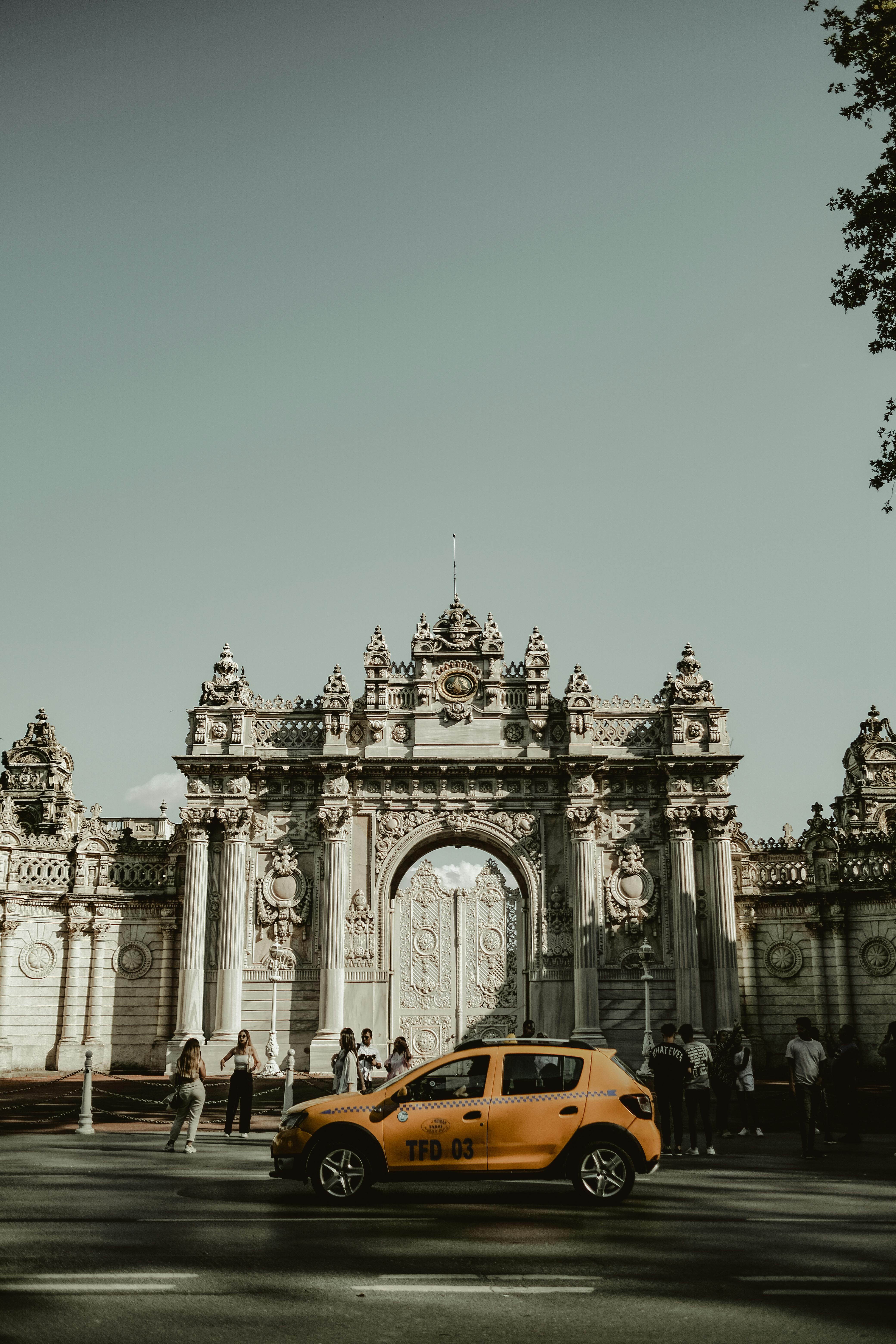 People Walking Passing Dolmabahçe Palace · Free Stock Photo