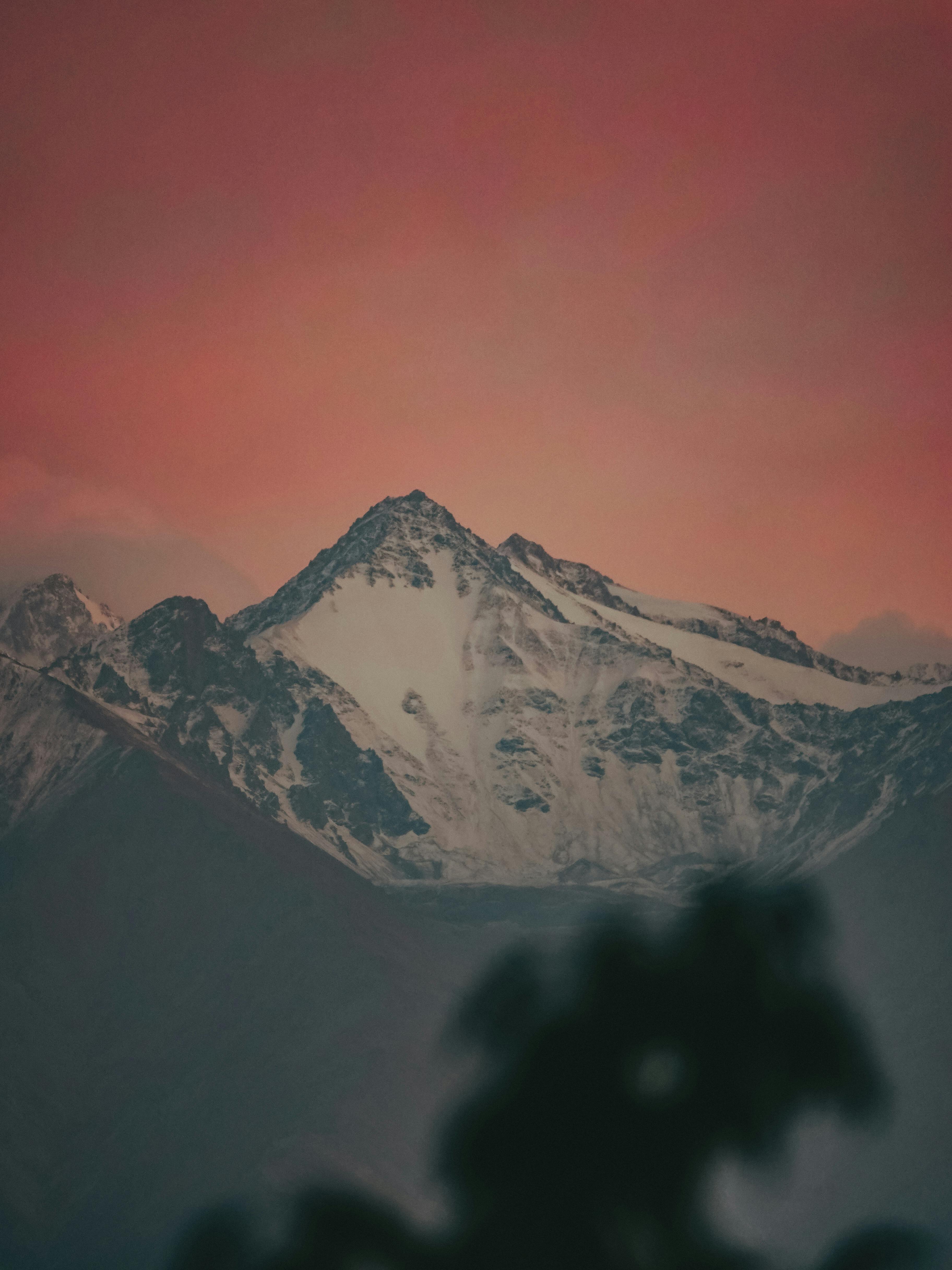 Mountains Covered with Snow During Sunset · Free Stock Photo