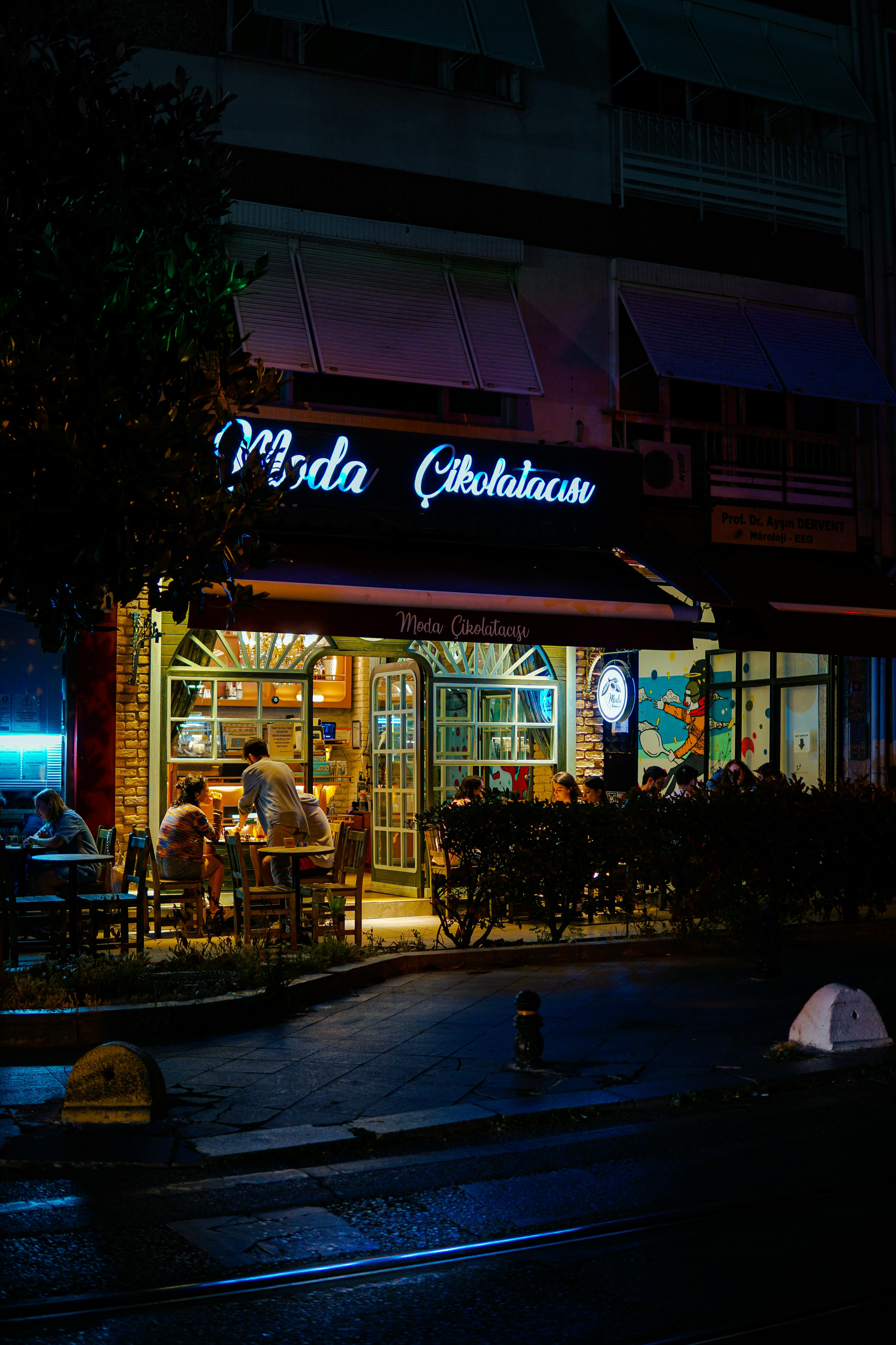 People in a Restaurant during Night Time · Free Stock Photo