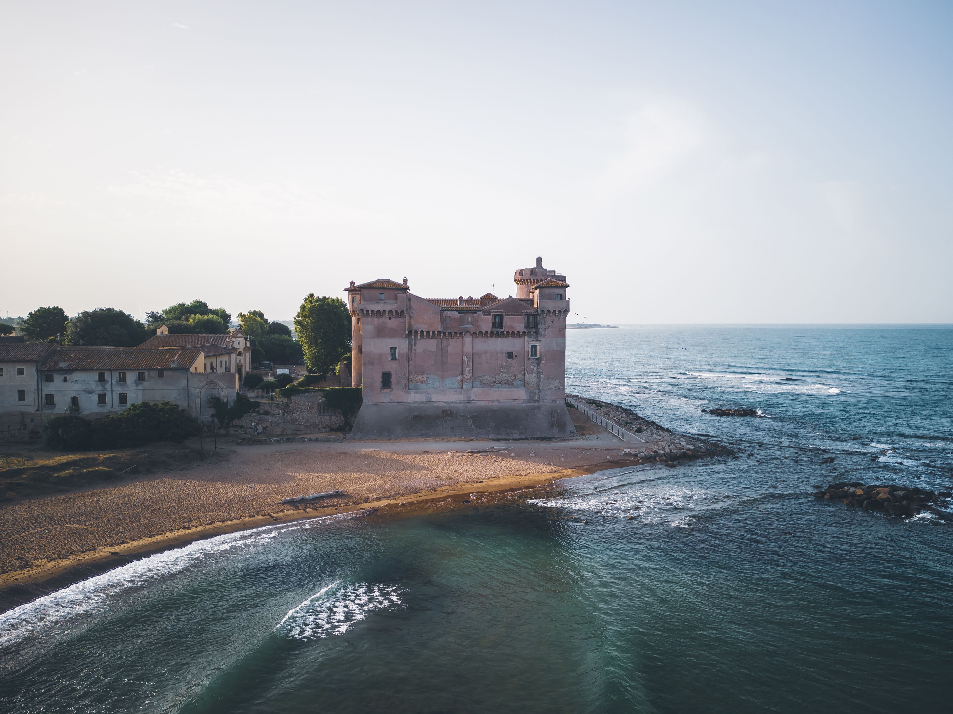 Grayscale Photograph of the Santa Severa Castle · Free Stock Photo