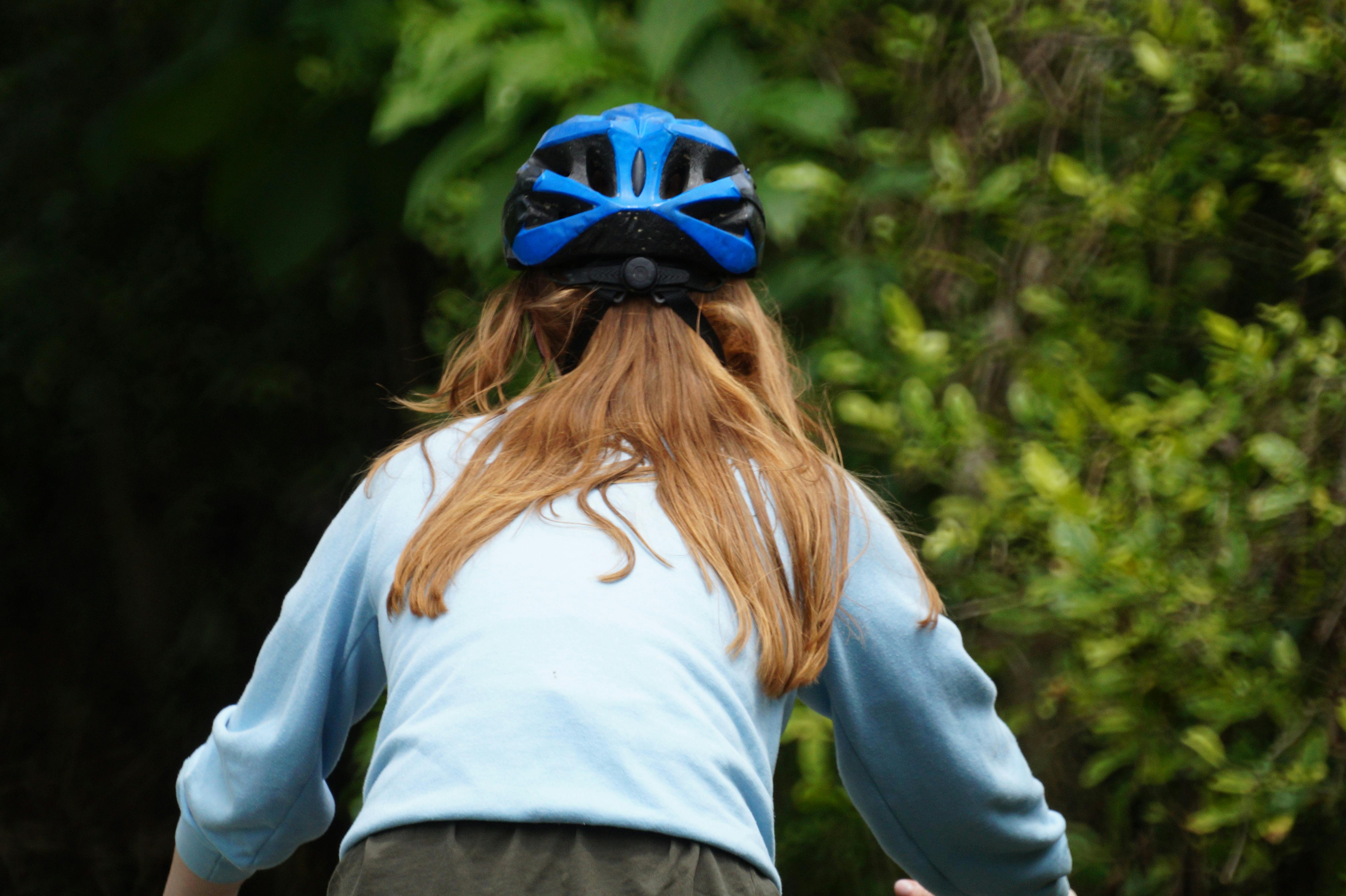 Back View of a Woman Wearing Helmet · Free Stock Photo