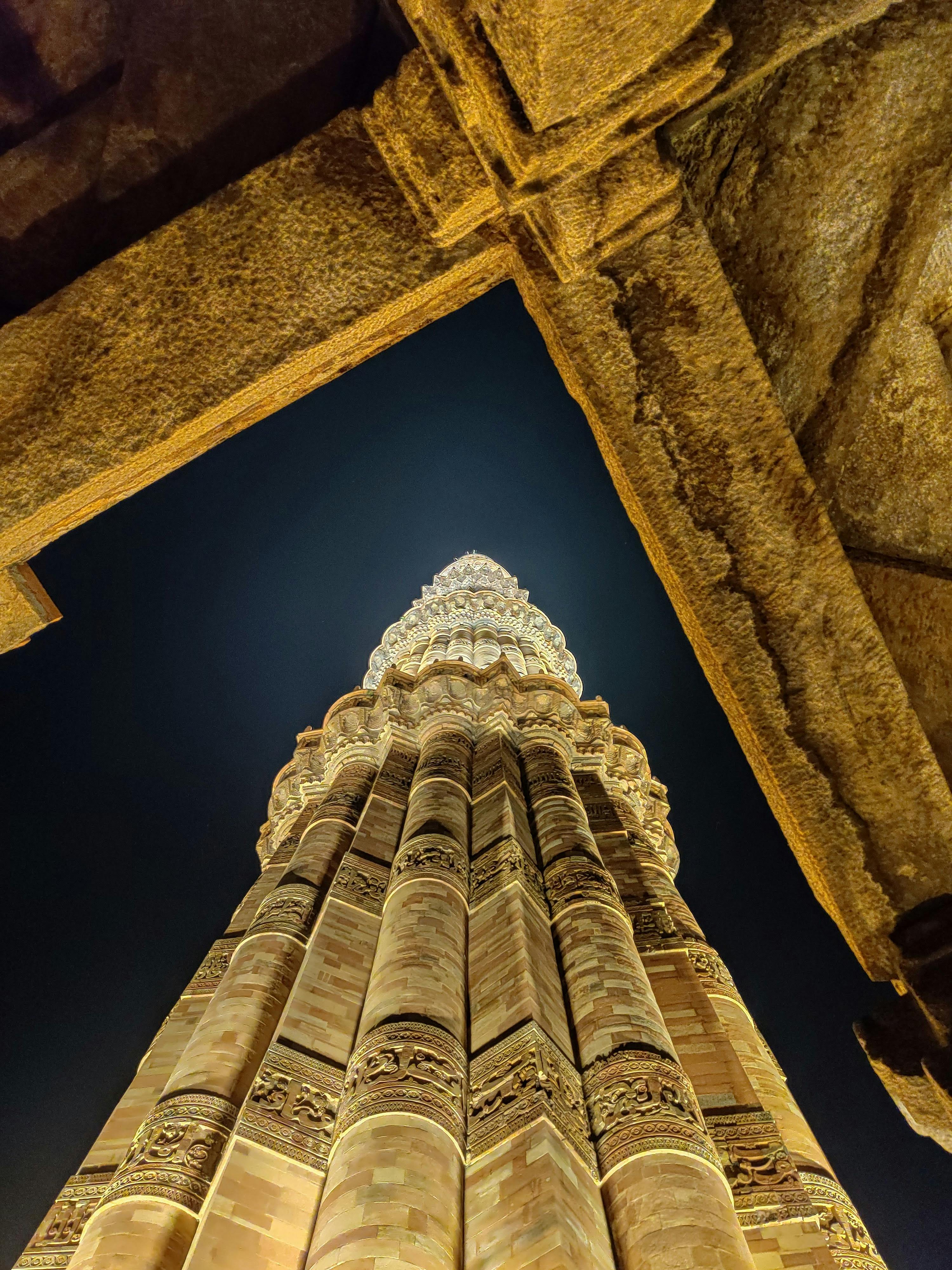 Low Angle Shot of Illuminated Historical Tower · Free Stock Photo