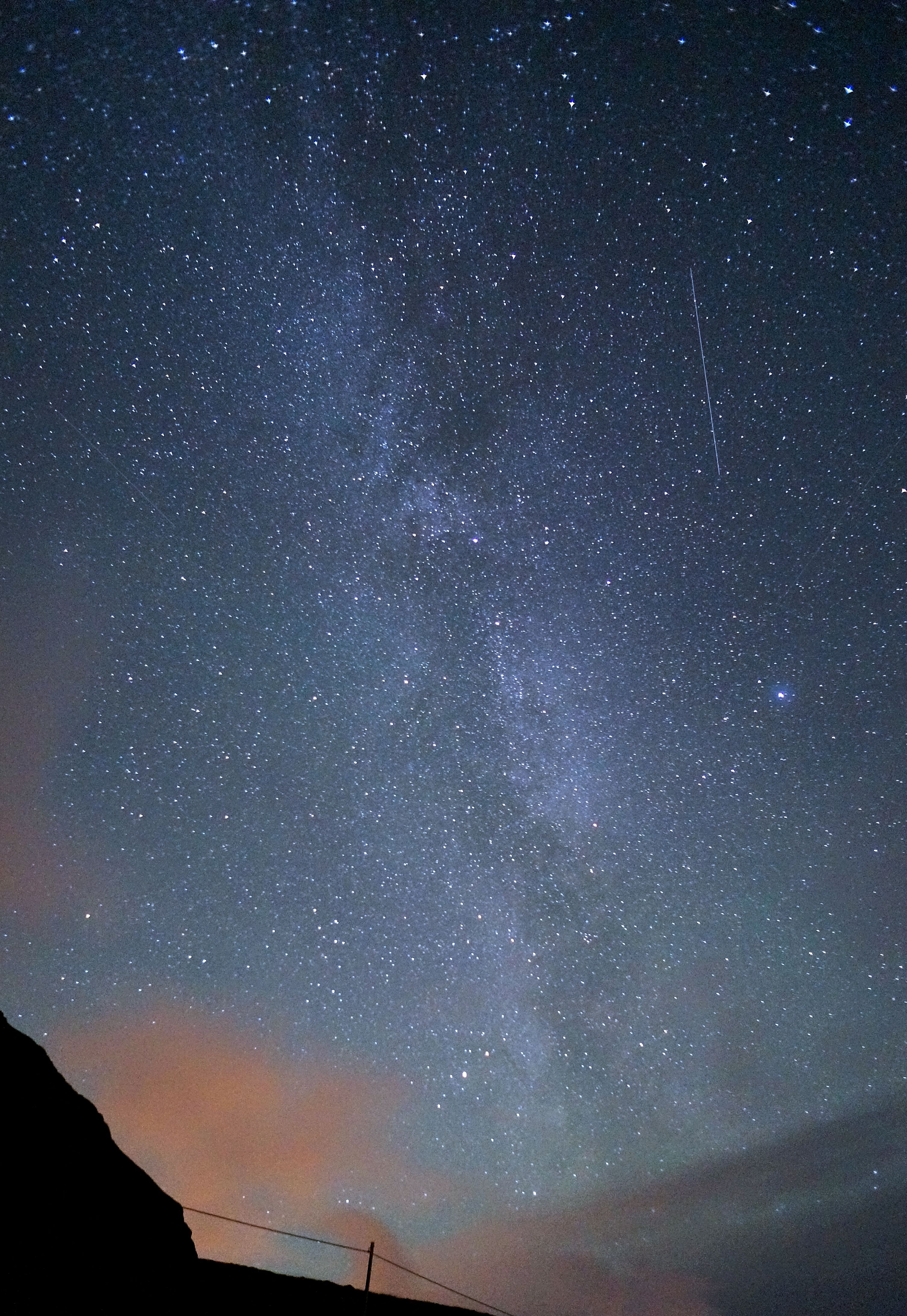 Crater Between Mountains Under Blue Sky White Clouds and Stars during ...