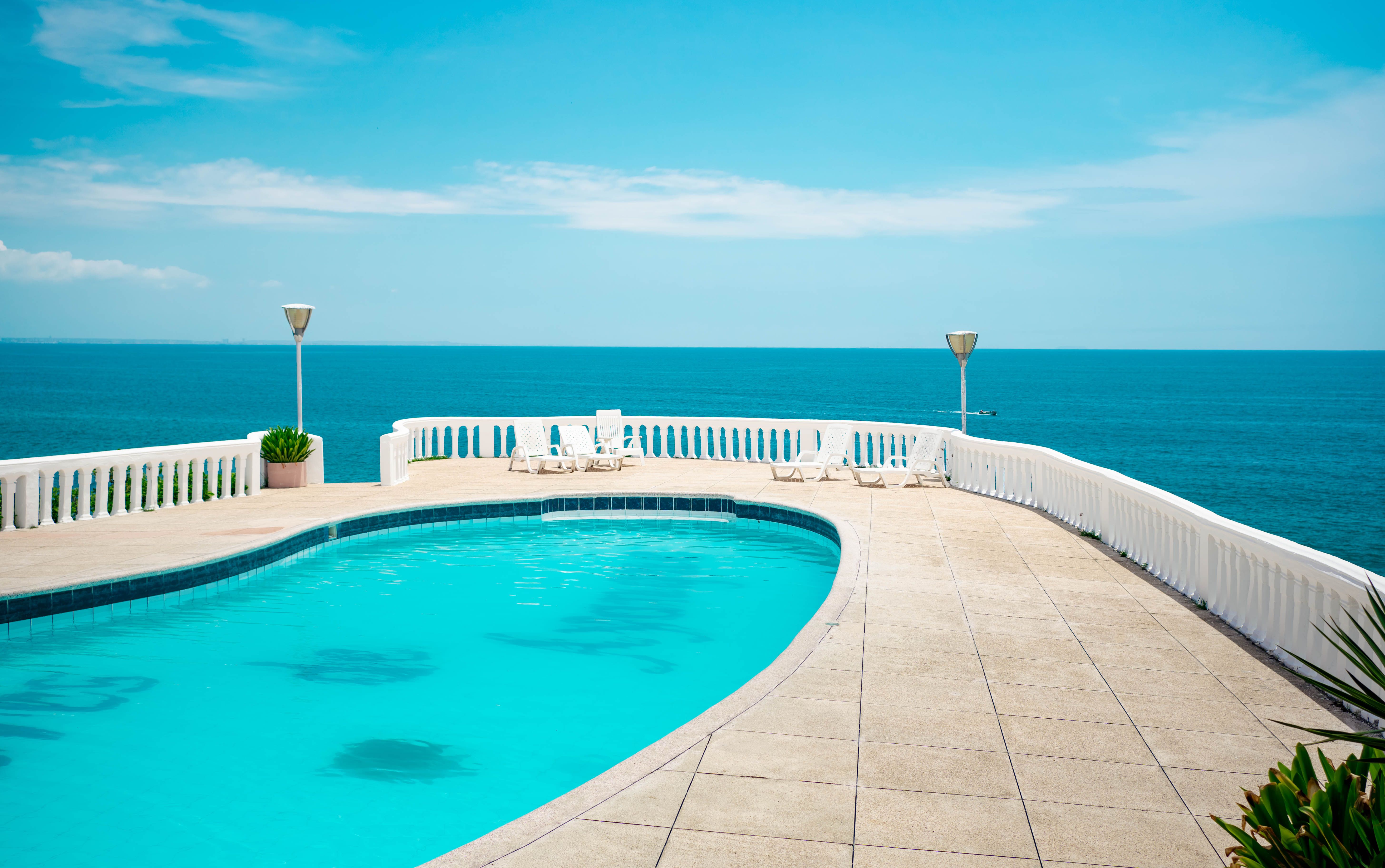 Swimming Pool Near White Wooden Fence · Free Stock Photo