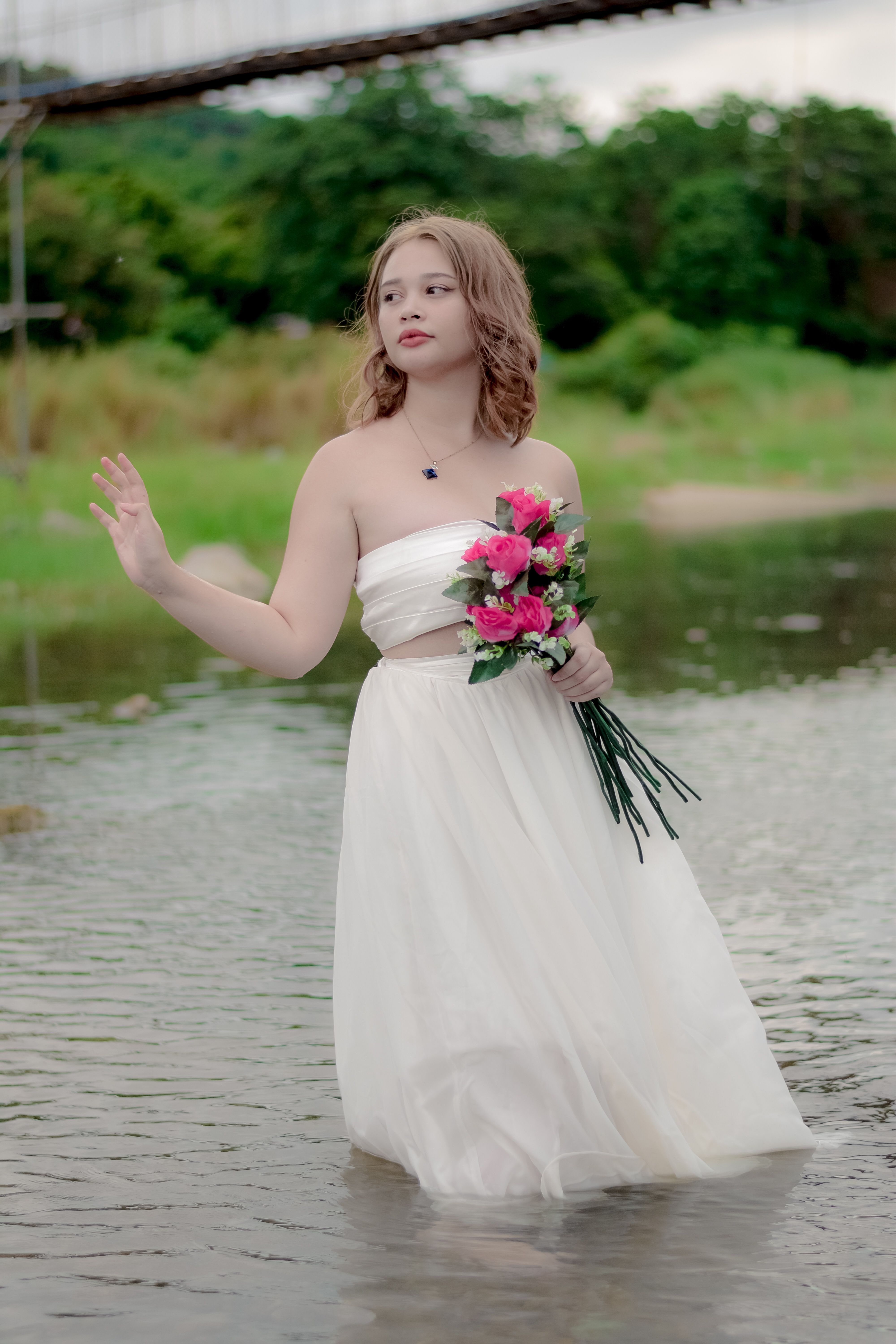 Bride Standing in a River · Free Stock Photo