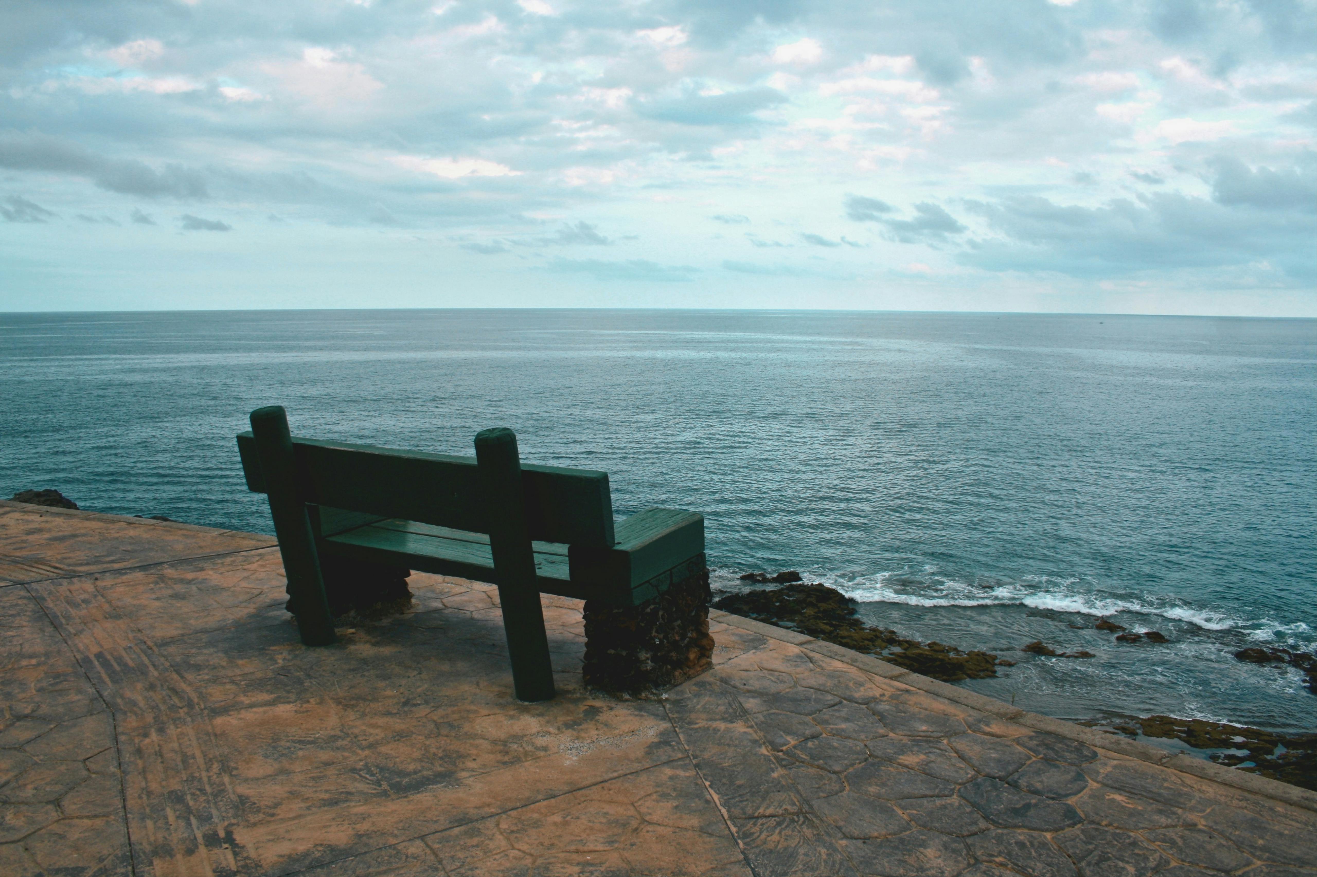 Empty Bench Beside Sea · Free Stock Photo