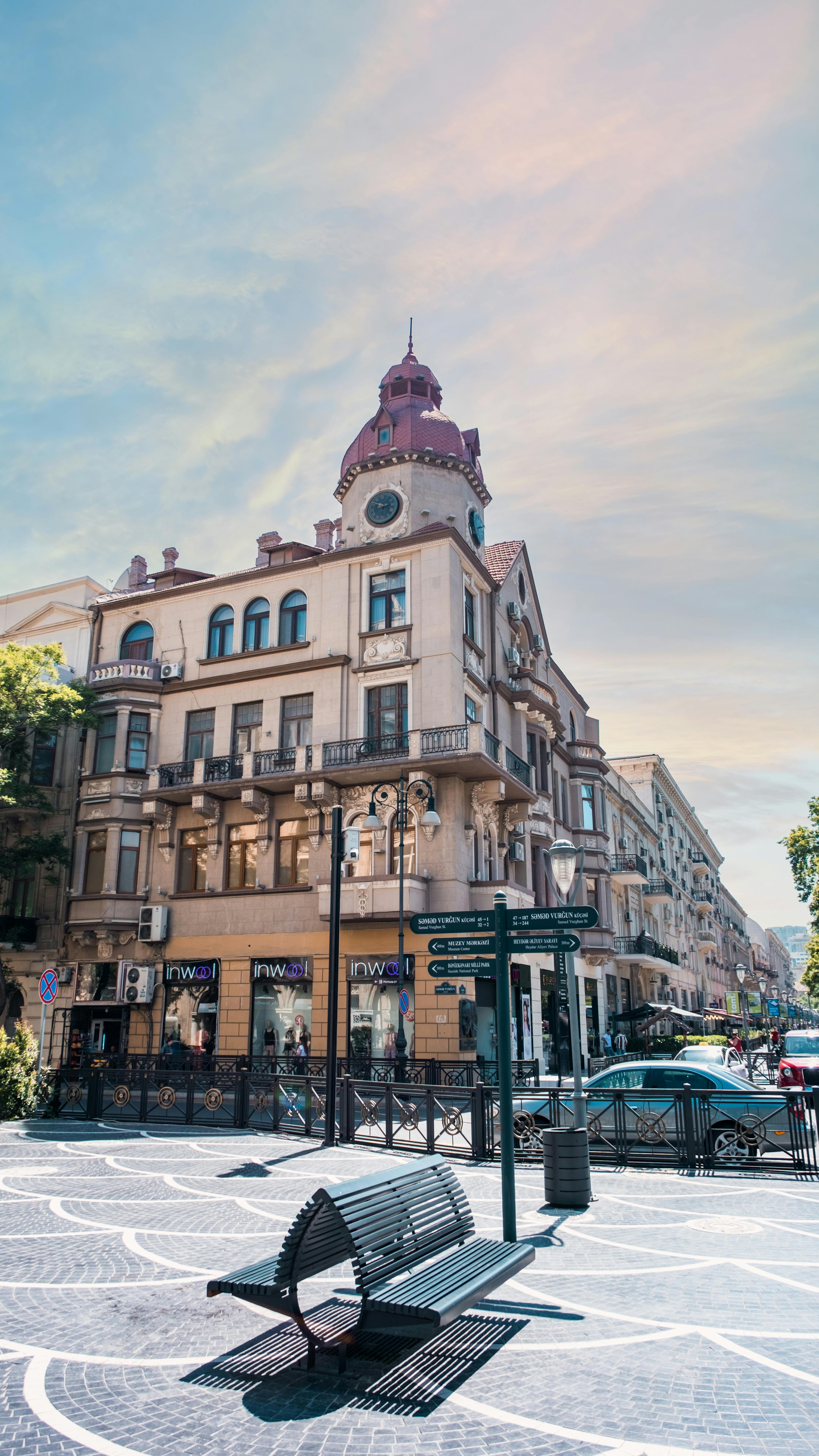 Town Square and a Residential Building · Free Stock Photo