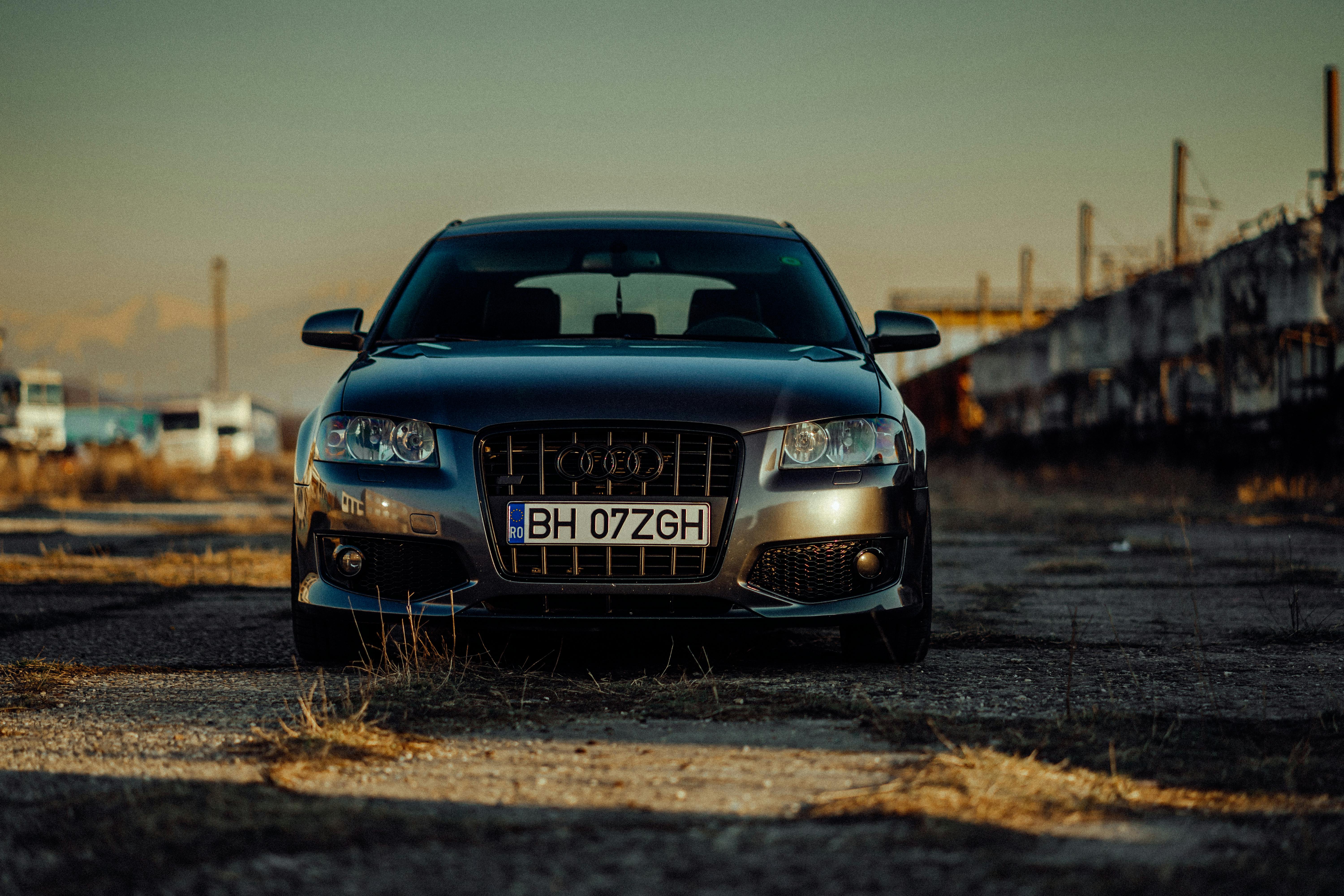 A Luxury Car Parked on the Road · Free Stock Photo