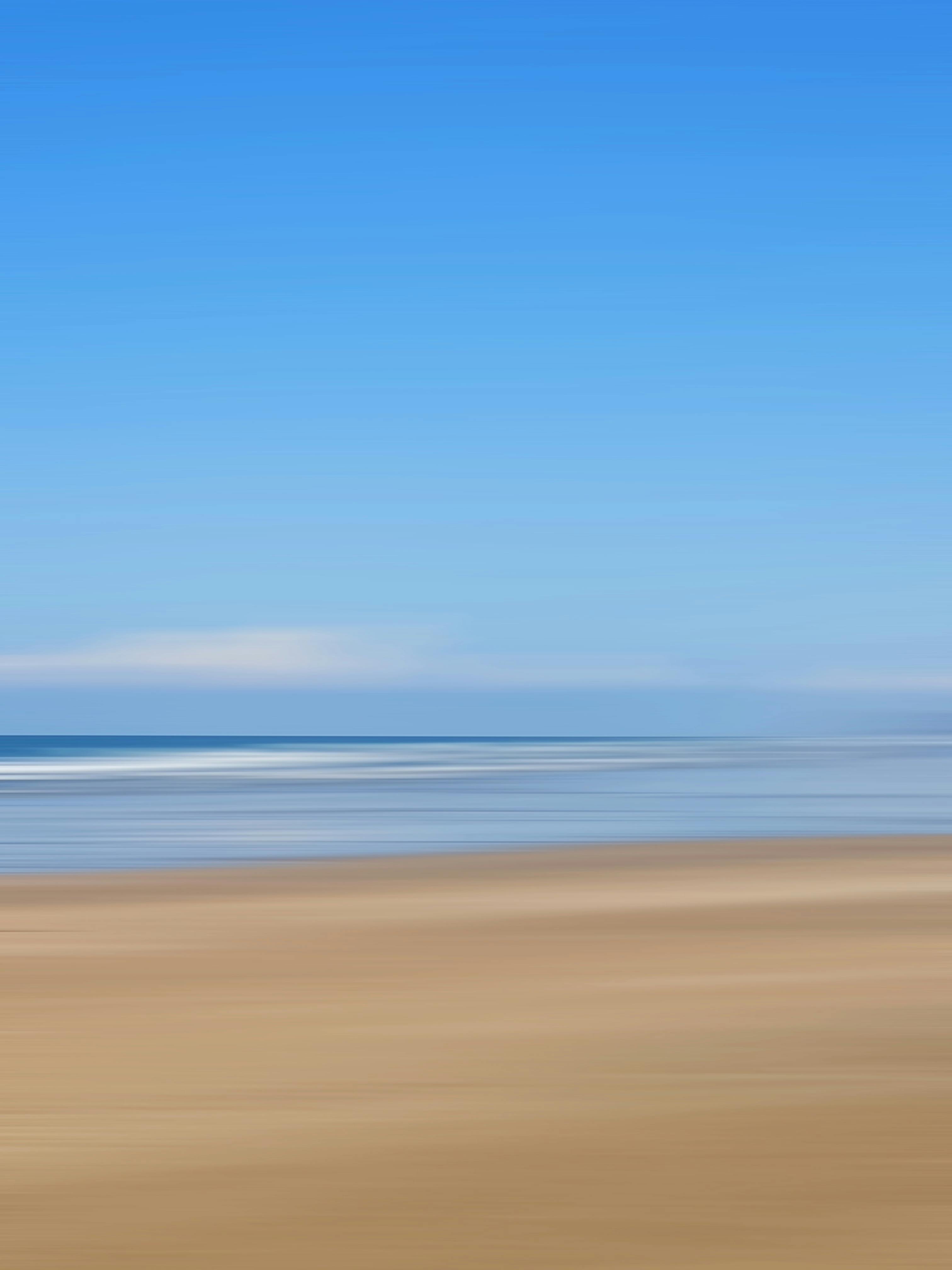 Beautiful Beach Under a Blue Sky · Free Stock Photo