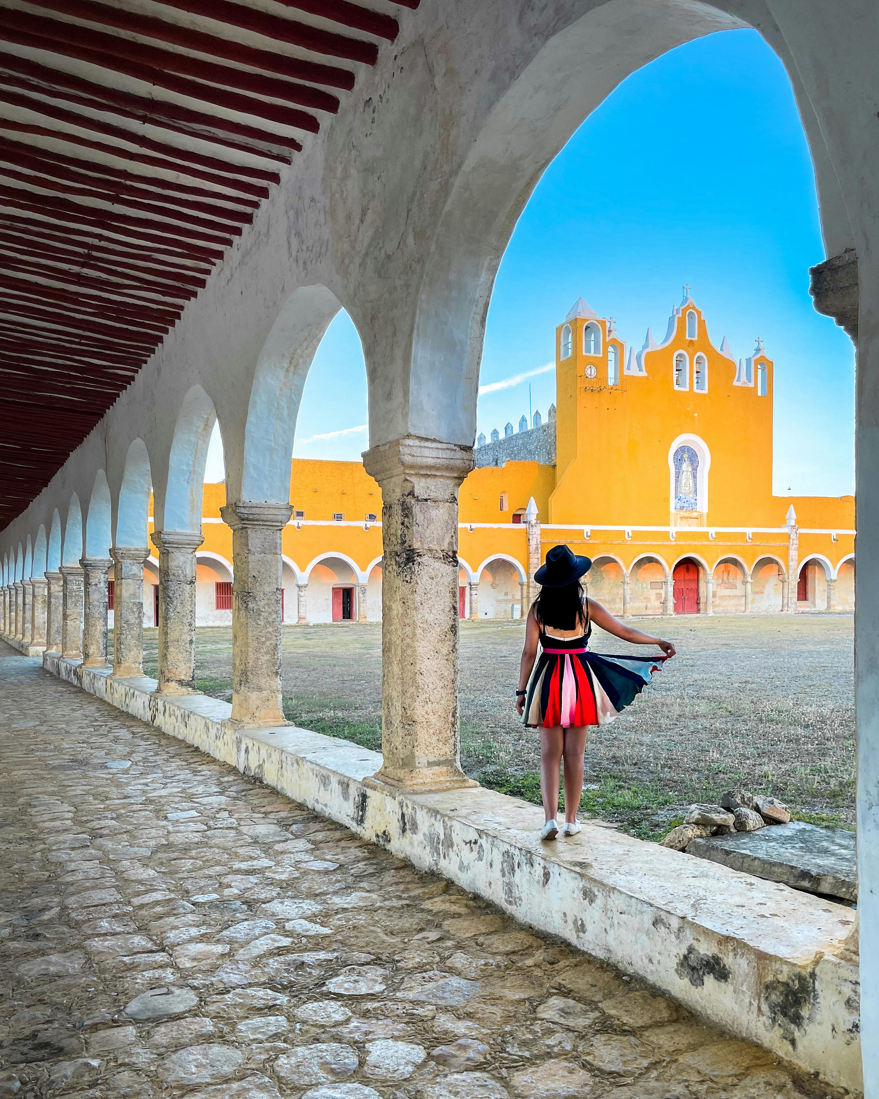 Photo of a Woman in a Colorful Dress against the Background of the ...
