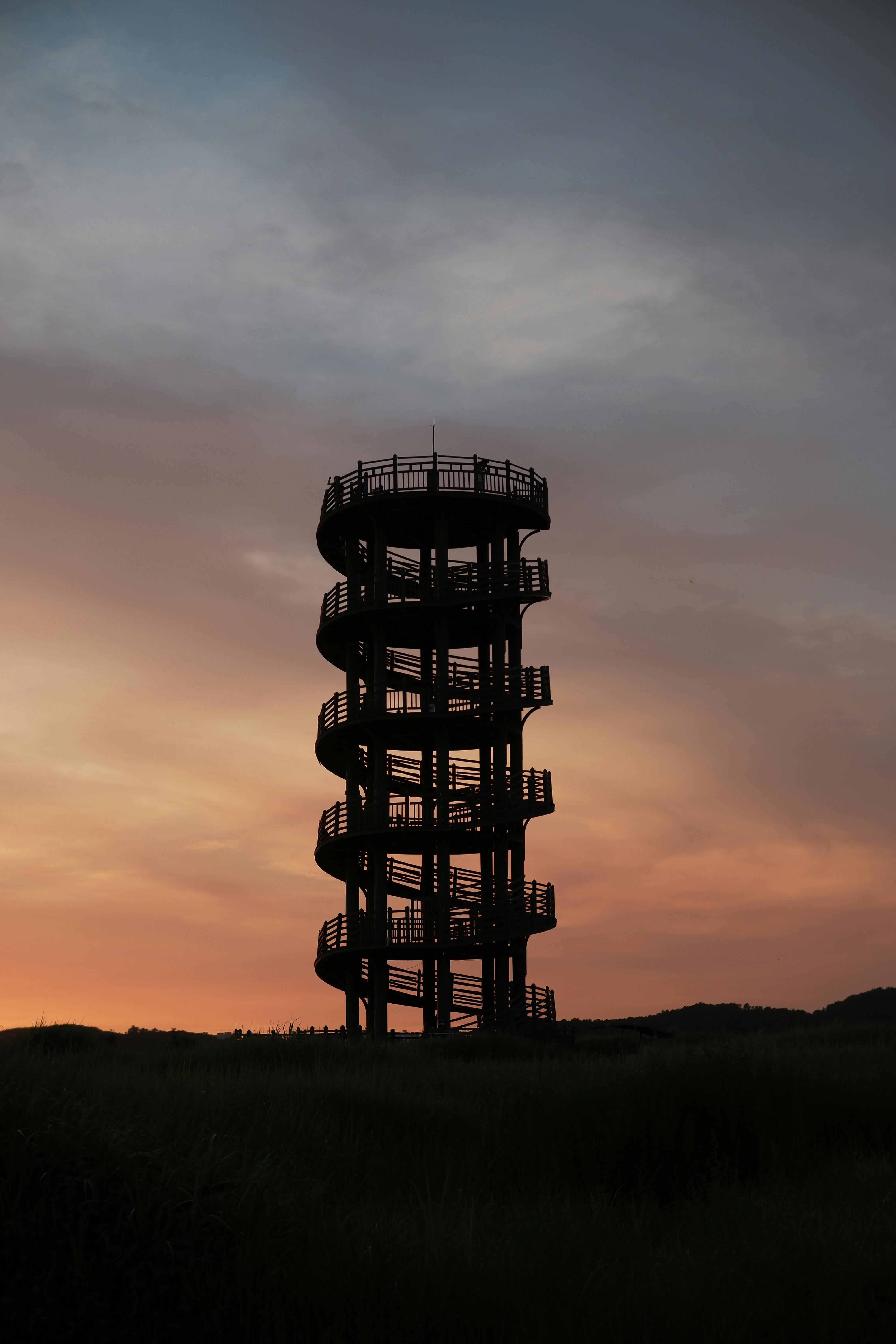 A Silhouette of a Spiral Observation Tower · Free Stock Photo