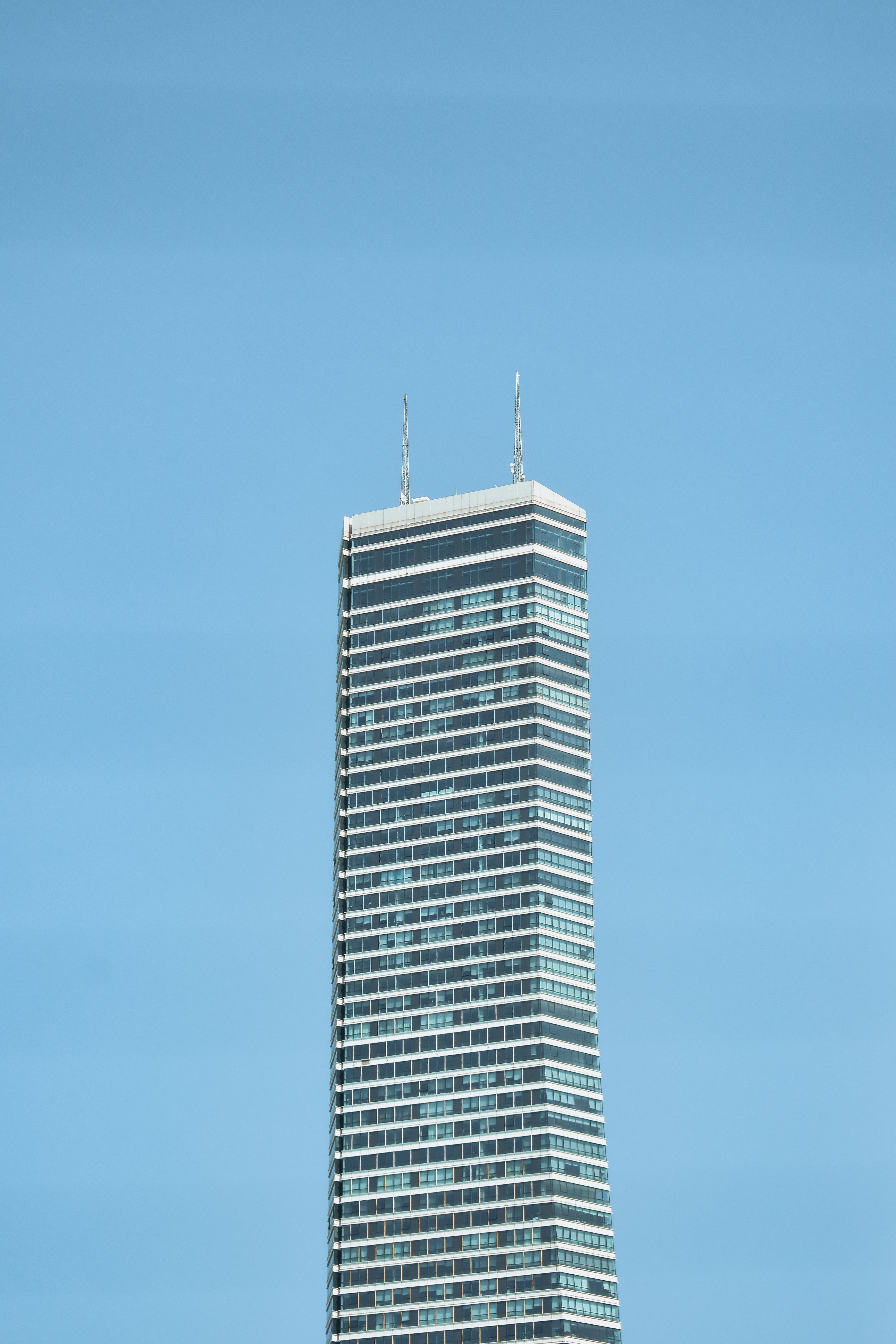 Skyscraper Against Blue Sky · Free Stock Photo