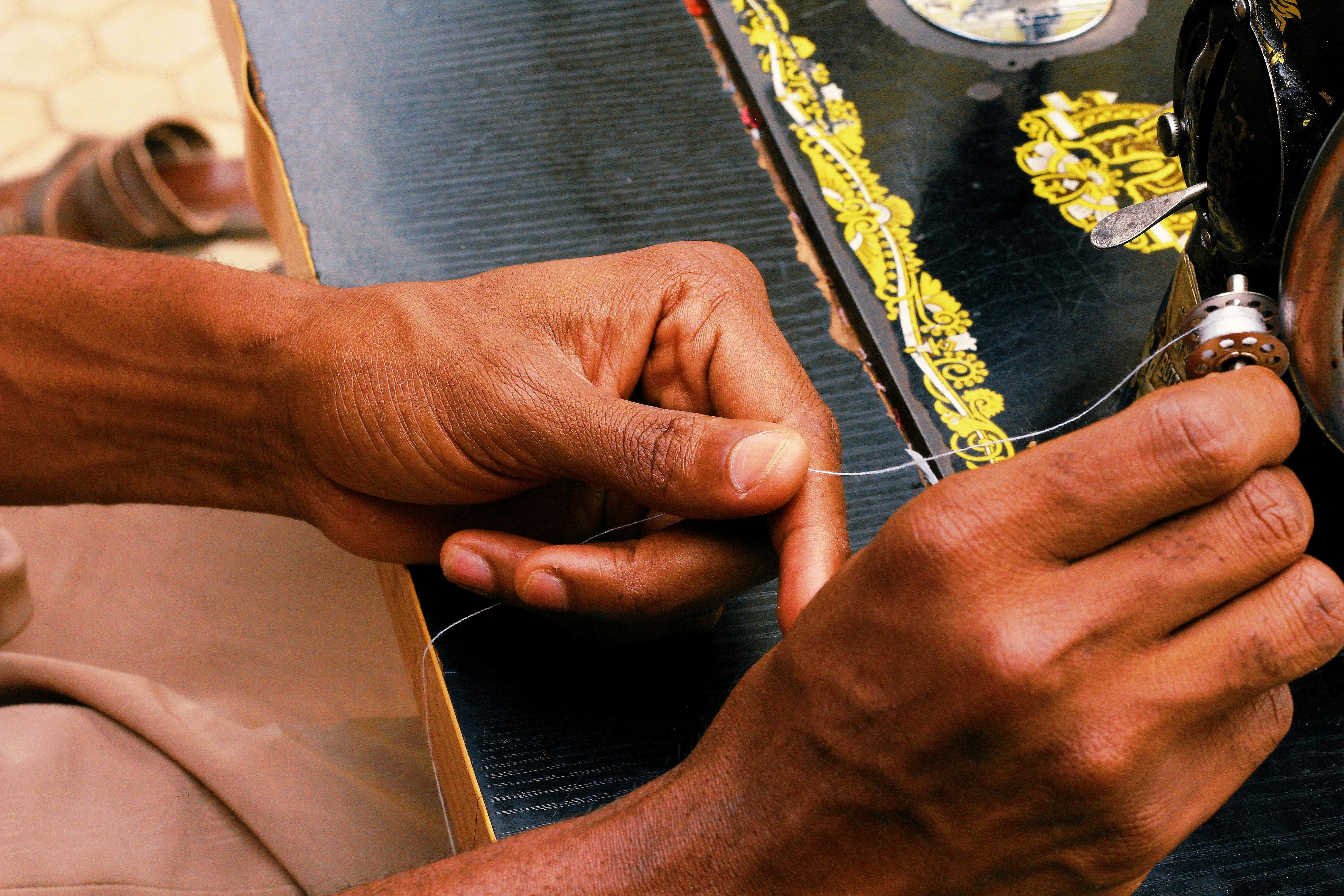 Man Hands Holding Thread · Free Stock Photo