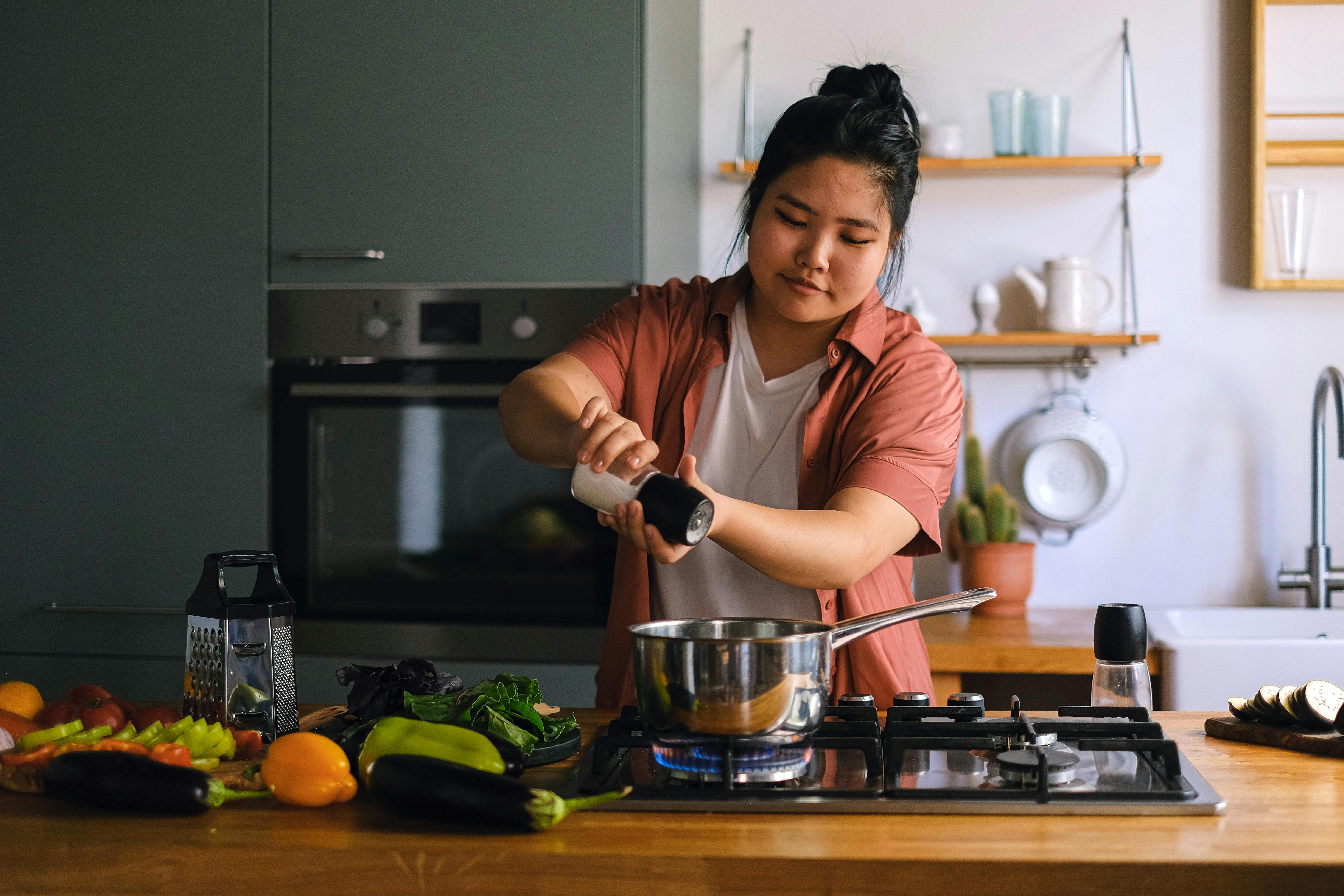 Home Cook Preparing Meal in Modern Kitchen · Free Stock Photo
