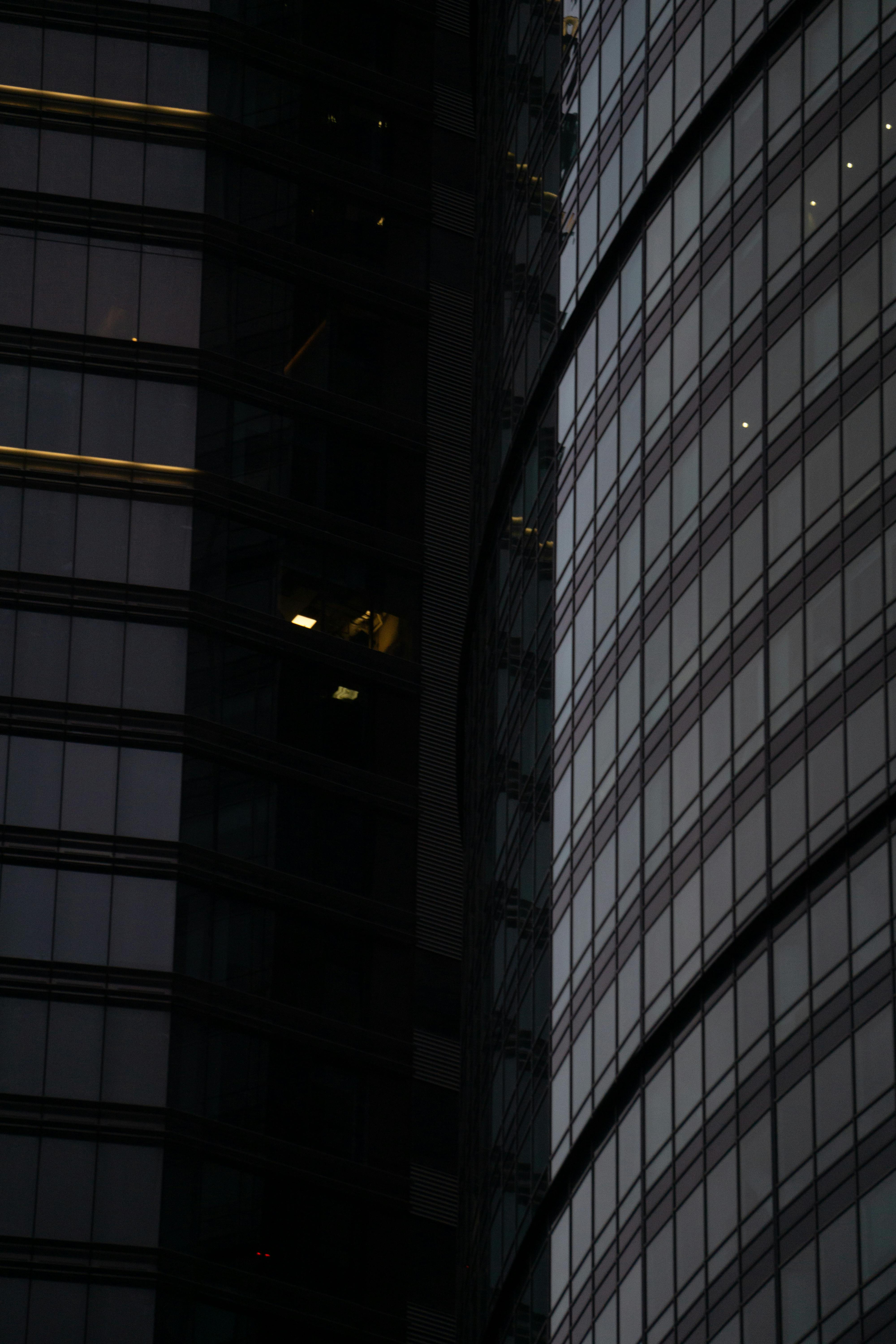 Photo of a High-Rise Building with Glass Windows · Free Stock Photo