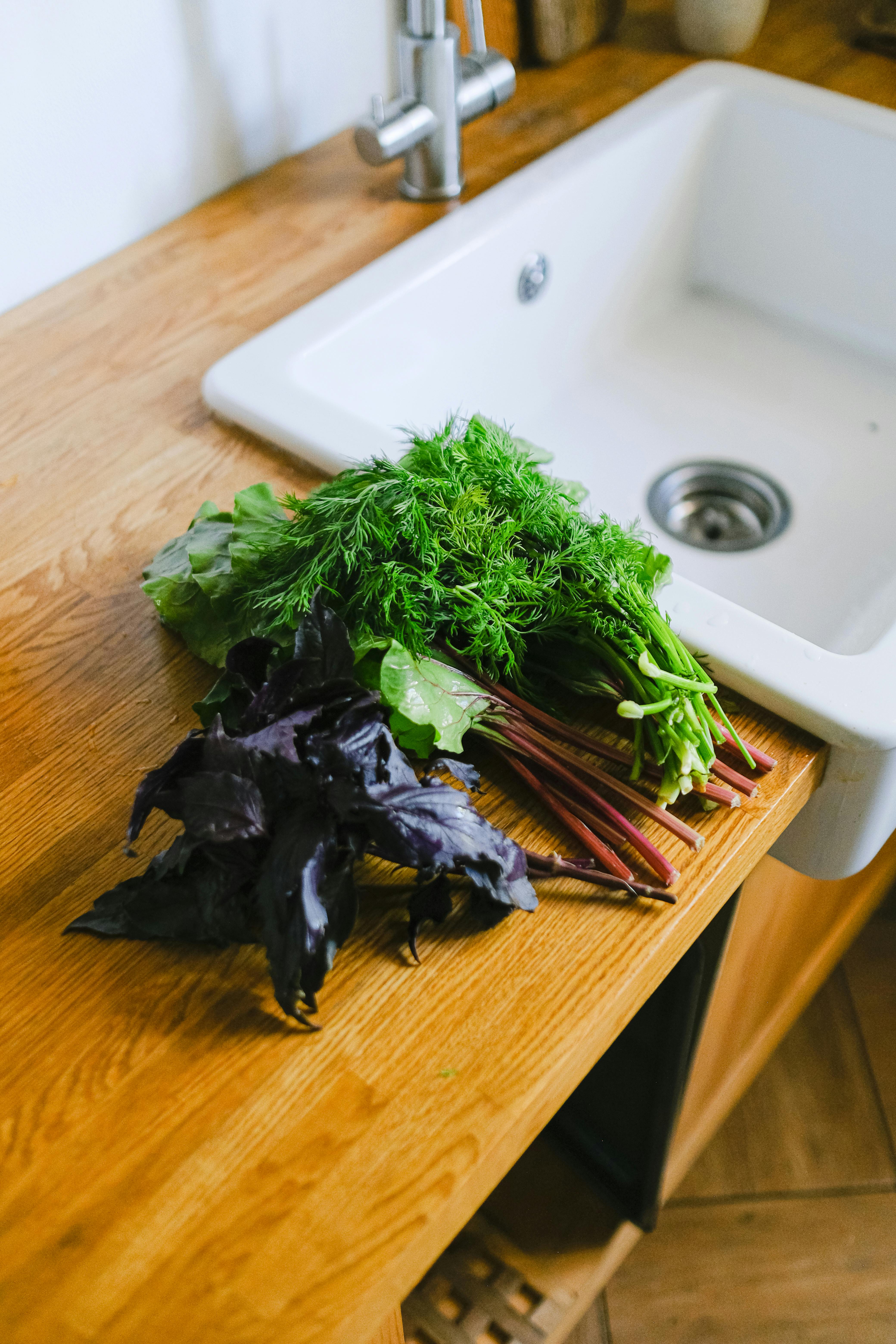 Fresh Vegetables Beside the Kitchen Sink · Free Stock Photo